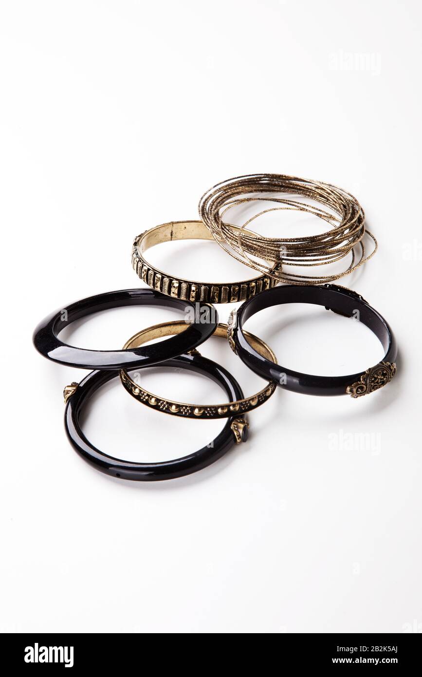 Set of traditional bangles over white background Stock Photo - Alamy