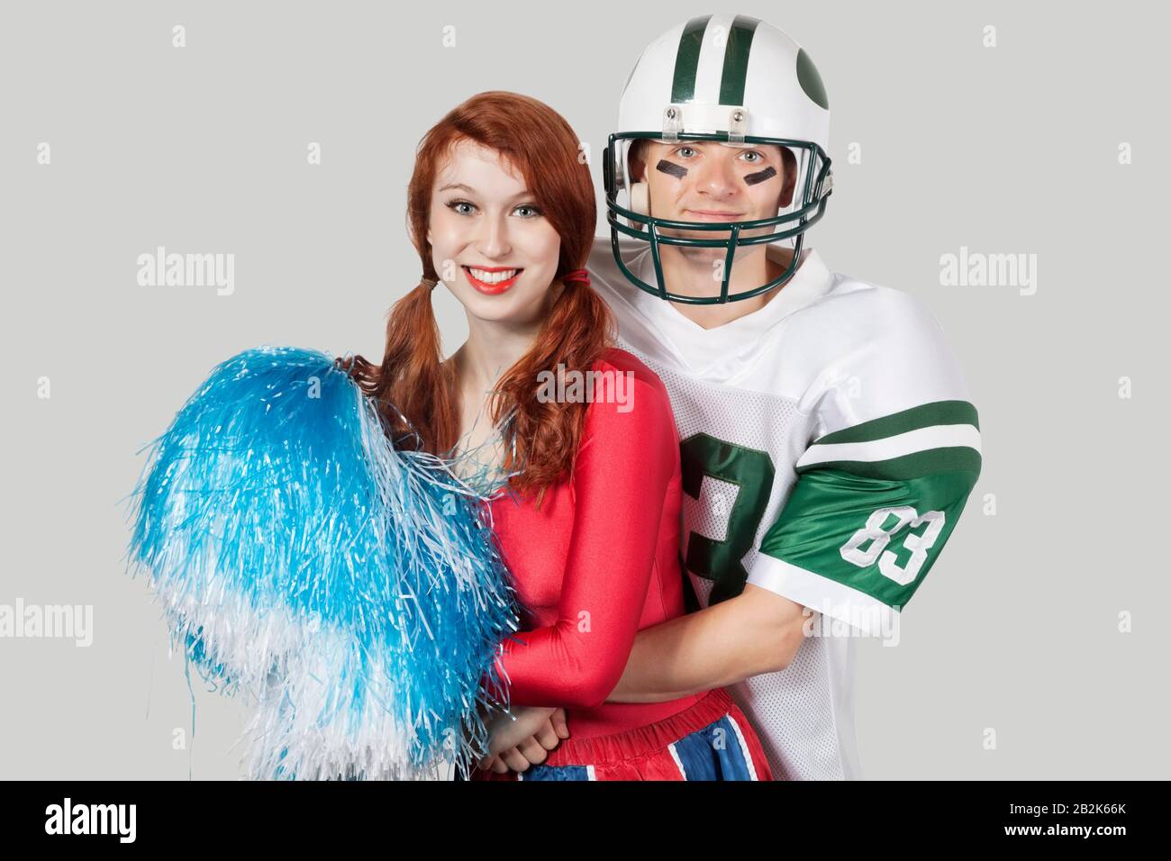 Huging Ball Player Cheerleader