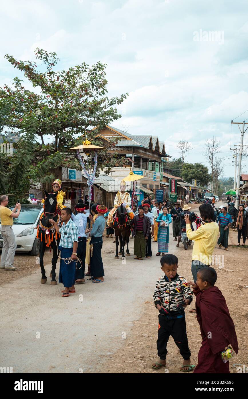 Traditional parade for Burmese child becoming a novice monk in Inthein ...
