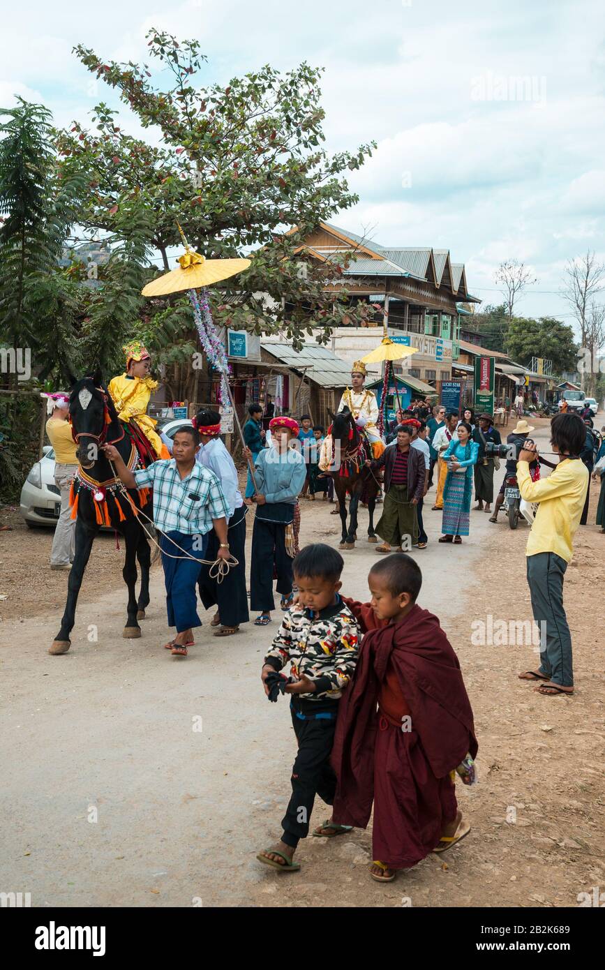 Traditional parade for Burmese child becoming a novice monk in Inthein ...