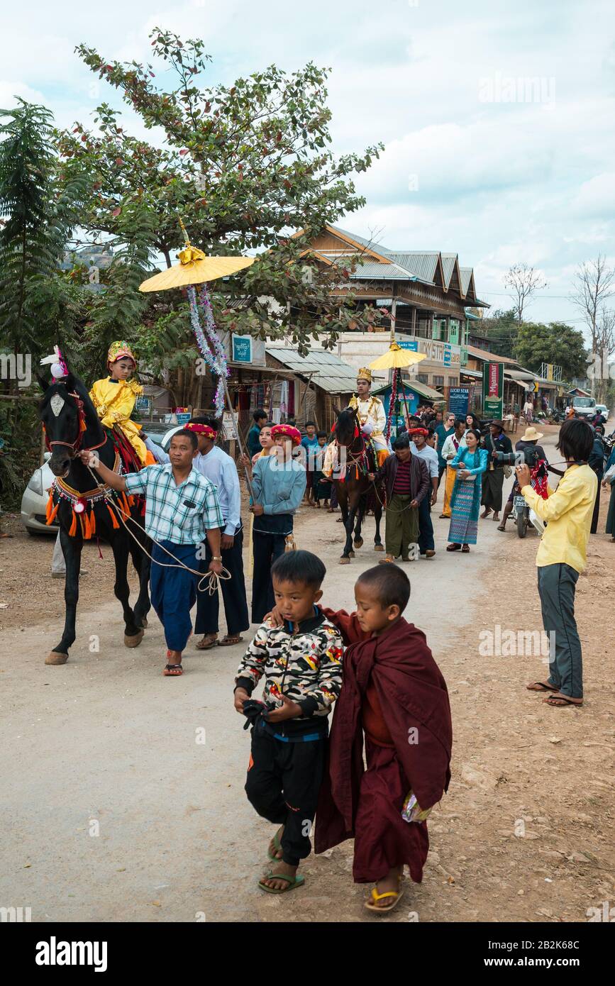 Traditional parade for Burmese child becoming a novice monk in Inthein ...