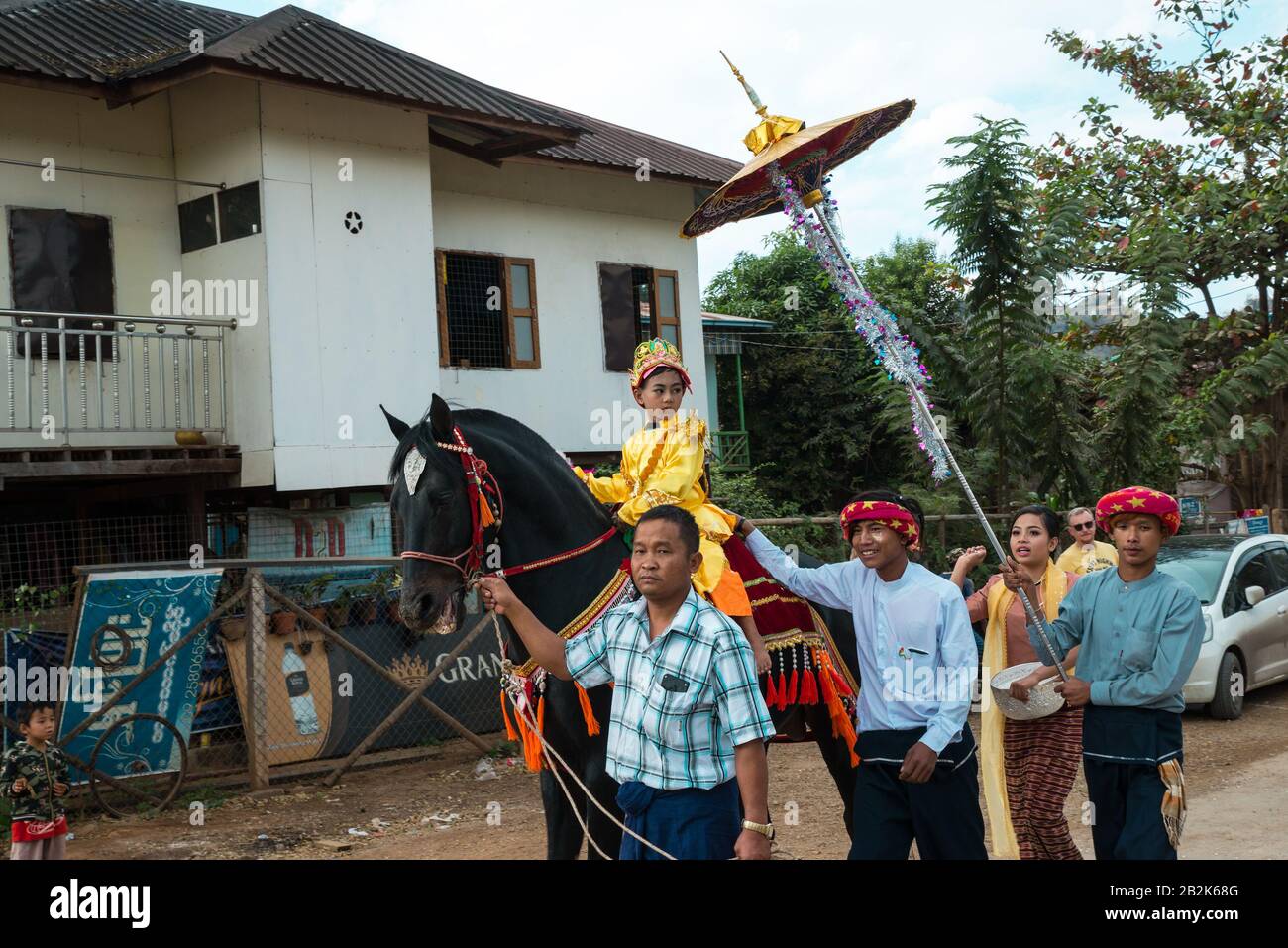 Traditional parade for Burmese child becoming a novice monk in Inthein ...