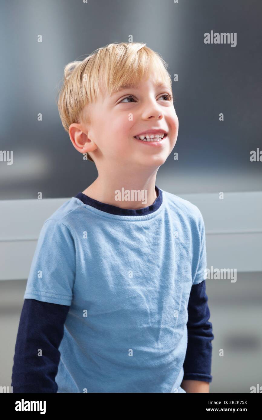 Cute Caucasian boy looking away Stock Photo - Alamy
