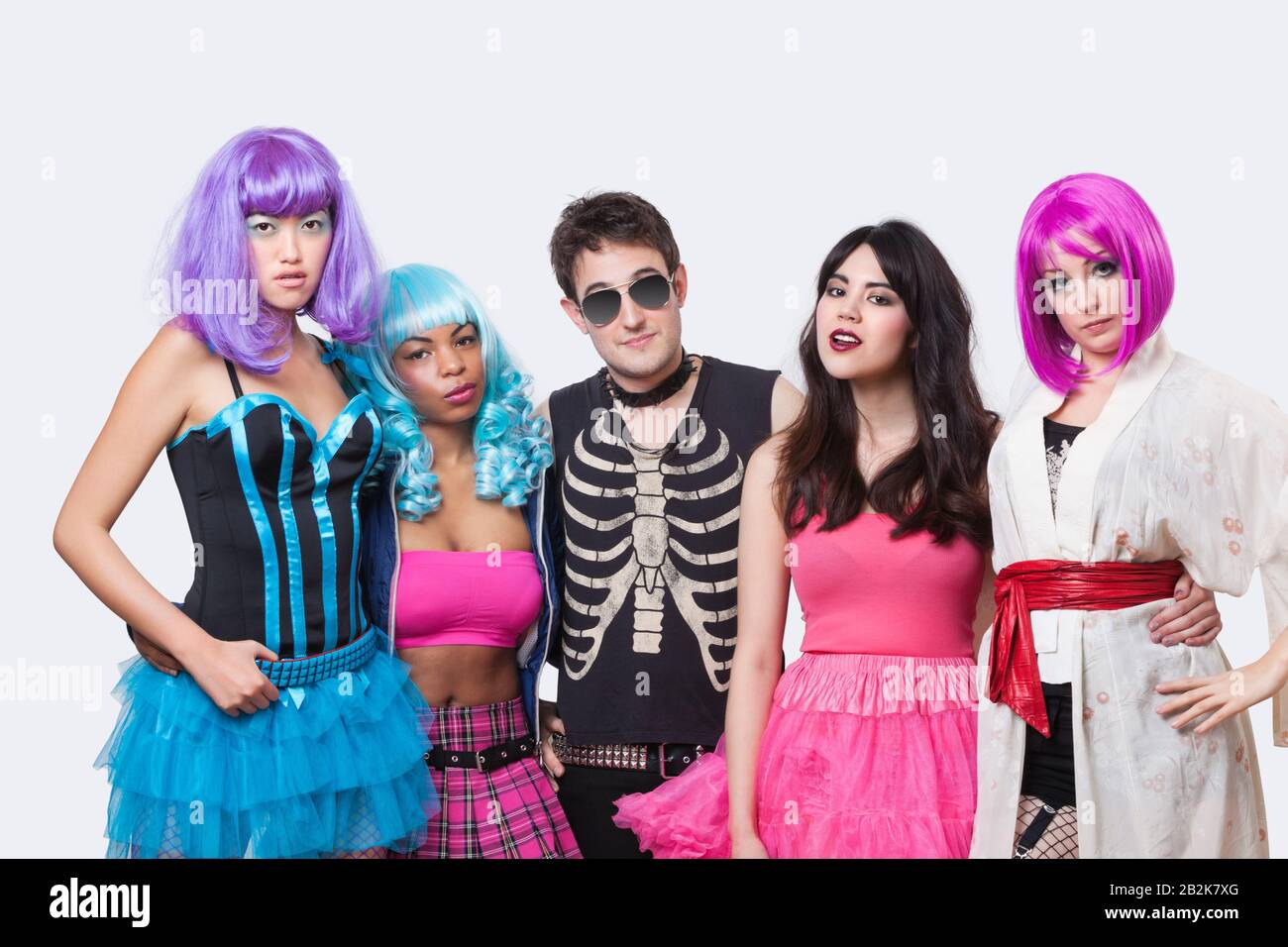 Portrait of young punk group over white background Stock Photo - Alamy