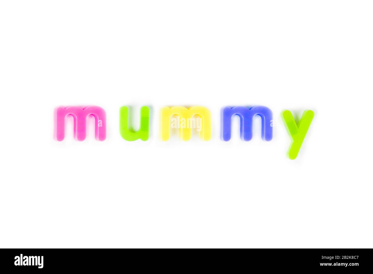 Colorful alphabet magnets spell 'mummy' over white background Stock ...