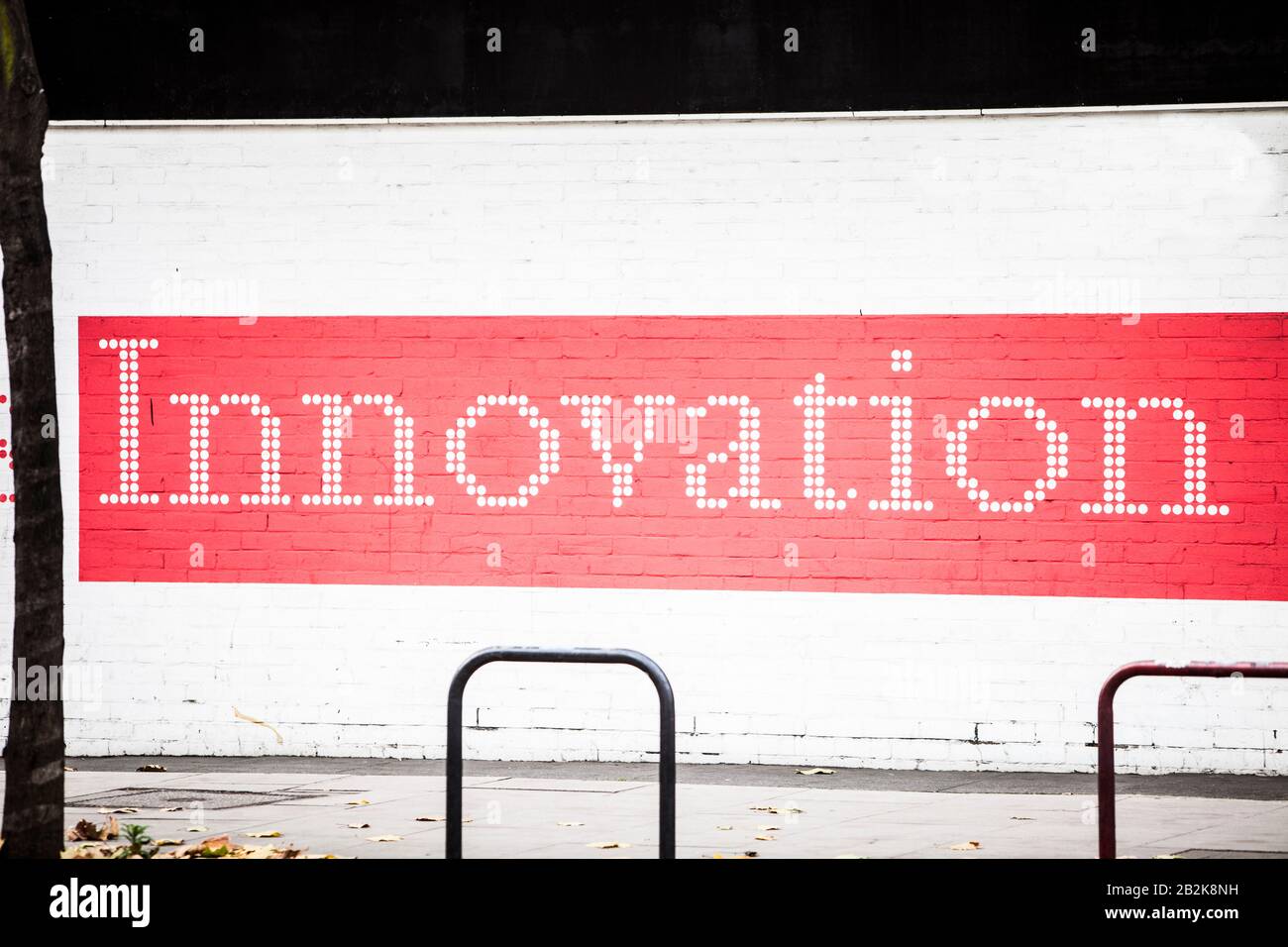 Innovation' written on wall Stock Photo - Alamy