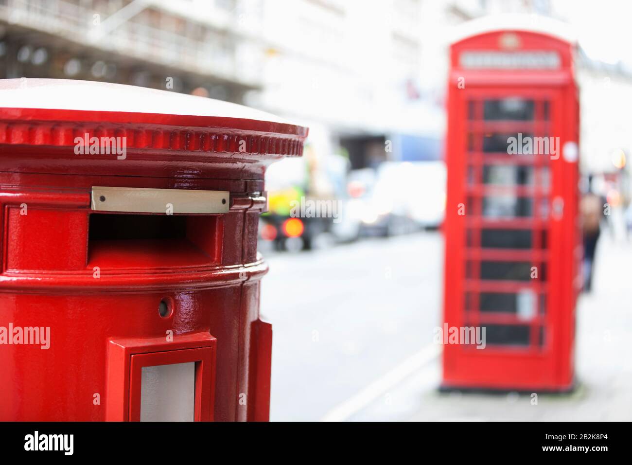 Red telephone booth and mail box Stock Photo - Alamy