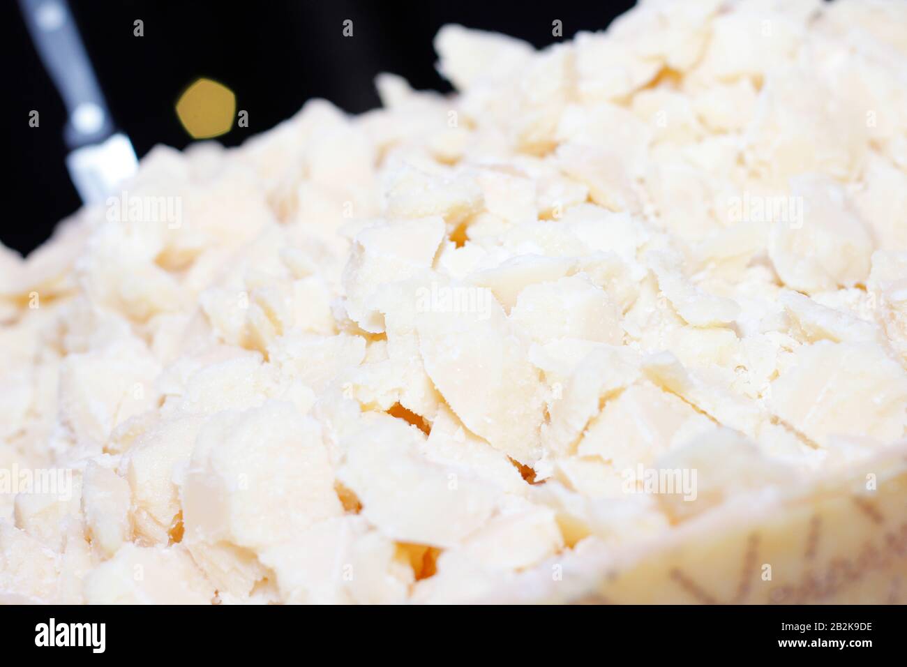 Cheese flakes served at the buffet for dinner Stock Photo - Alamy