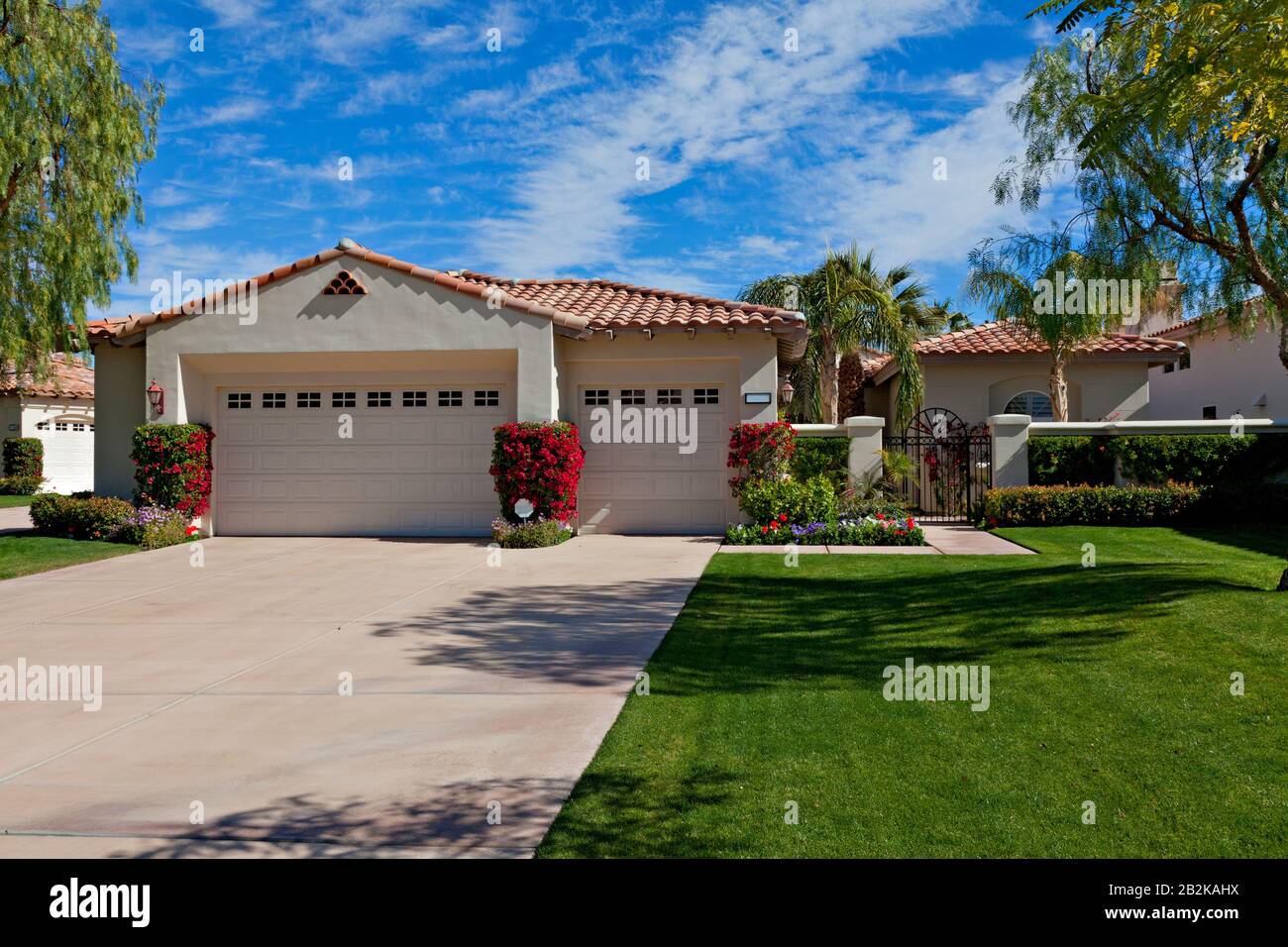 View up driveway to luxury villa Stock Photo - Alamy