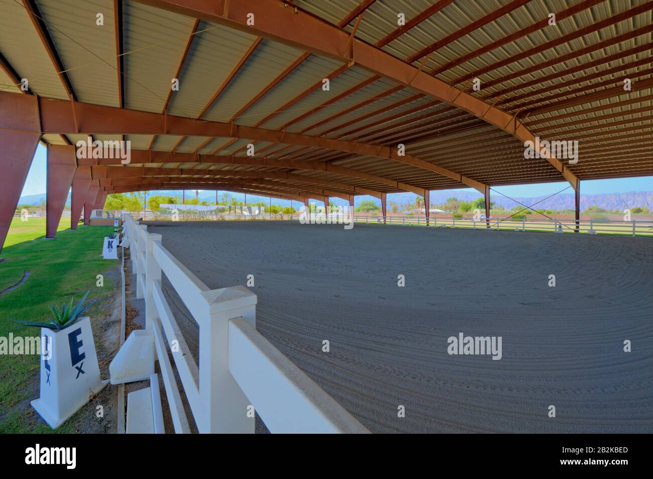 Covered Horse training area with timber fencing Stock Photo - Alamy