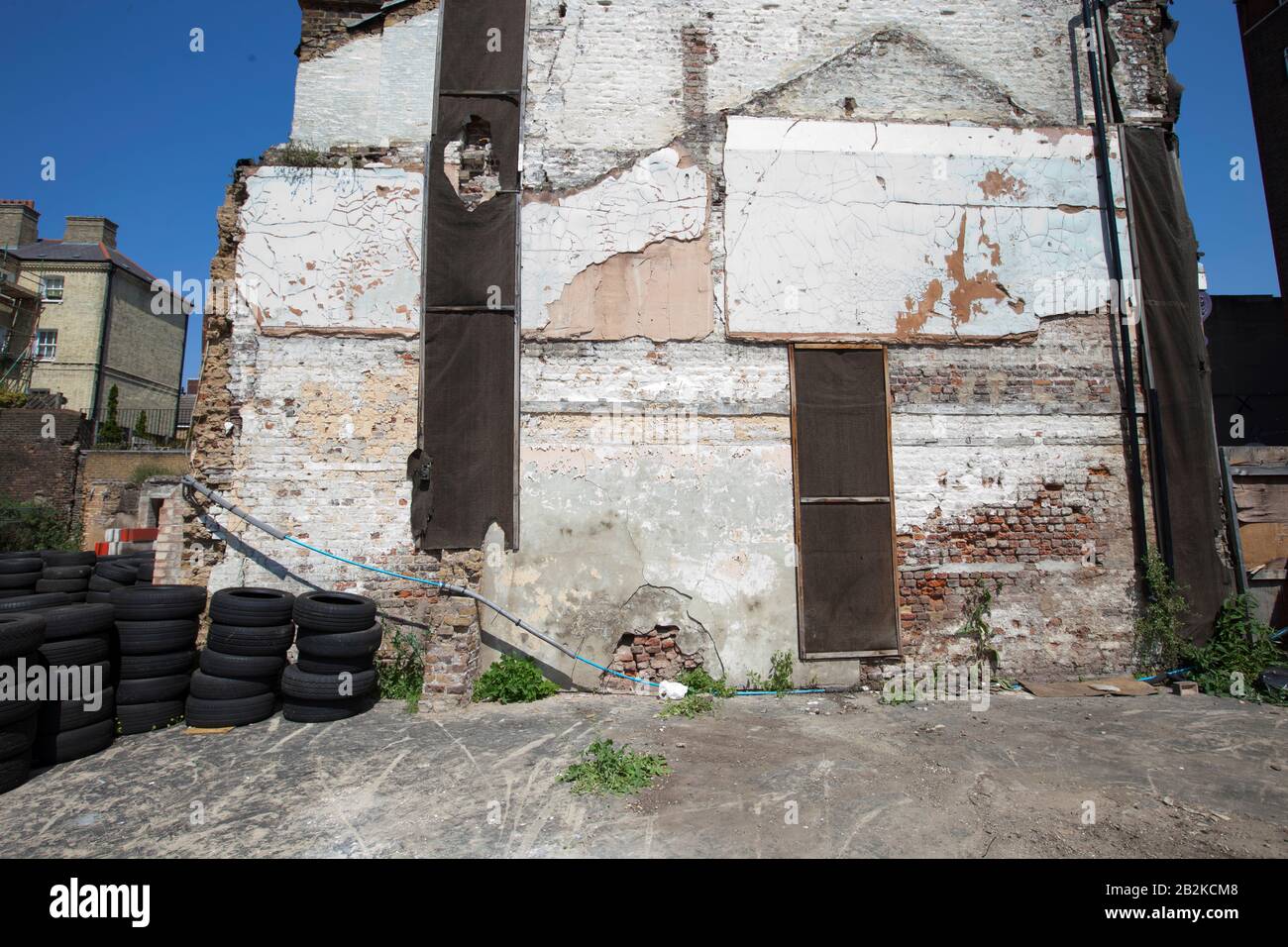 Remaining outline of a building after it was torn down Stock Photo - Alamy