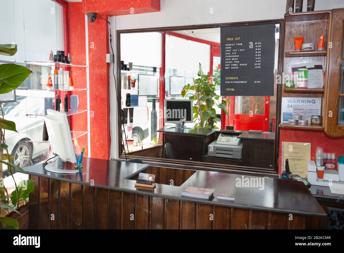 Reception desk at hair salon Stock Photo - Alamy