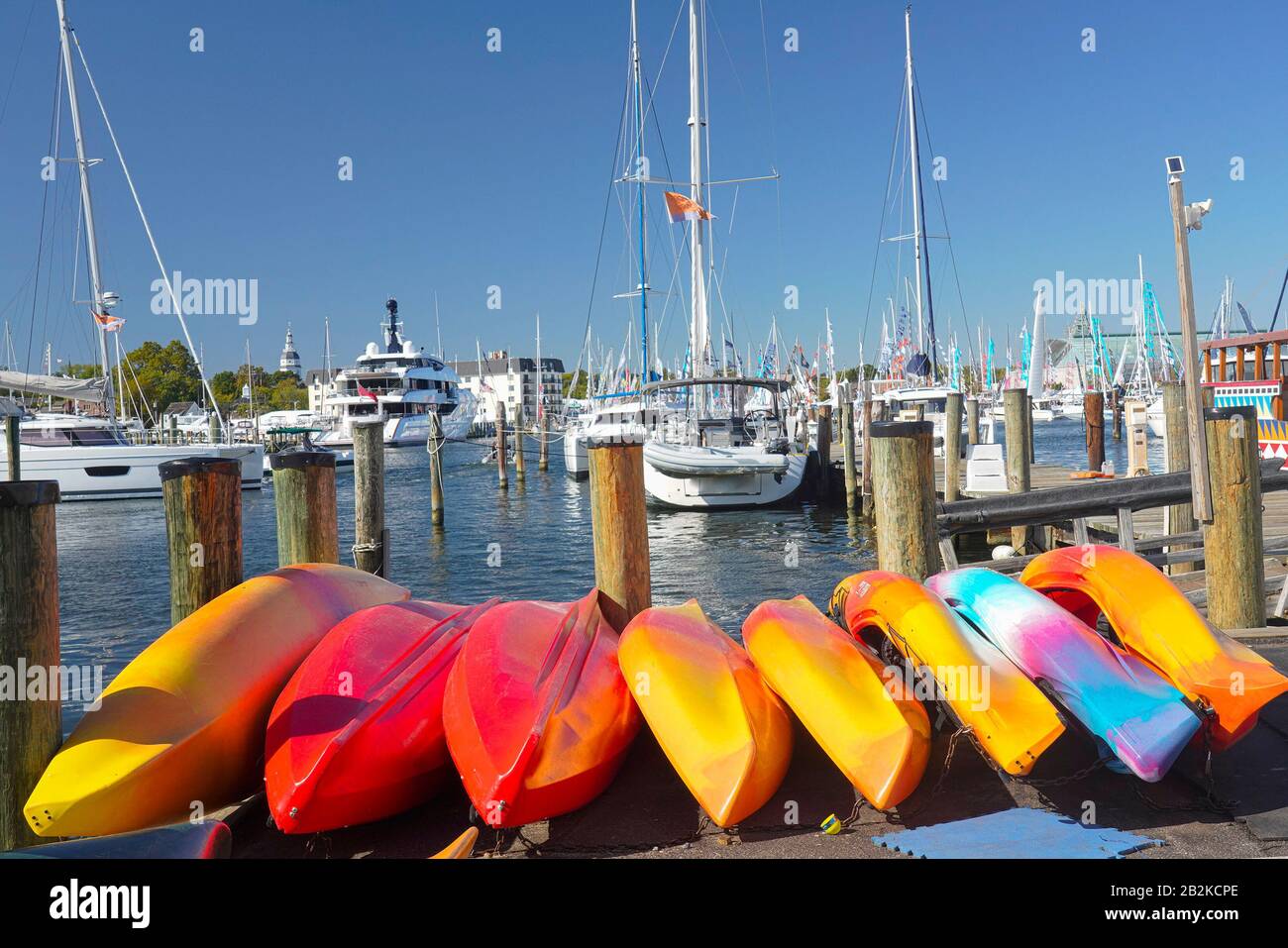 Orange and yellow kayaks hi-res stock photography and images - Alamy