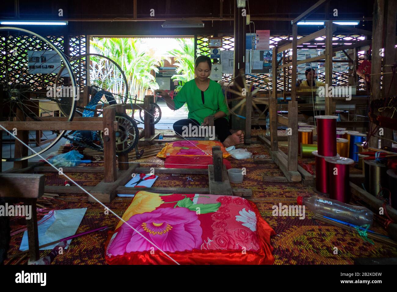 Siem Reap, Cambodia, Asia: reeling of silk threads in the workshops of ...