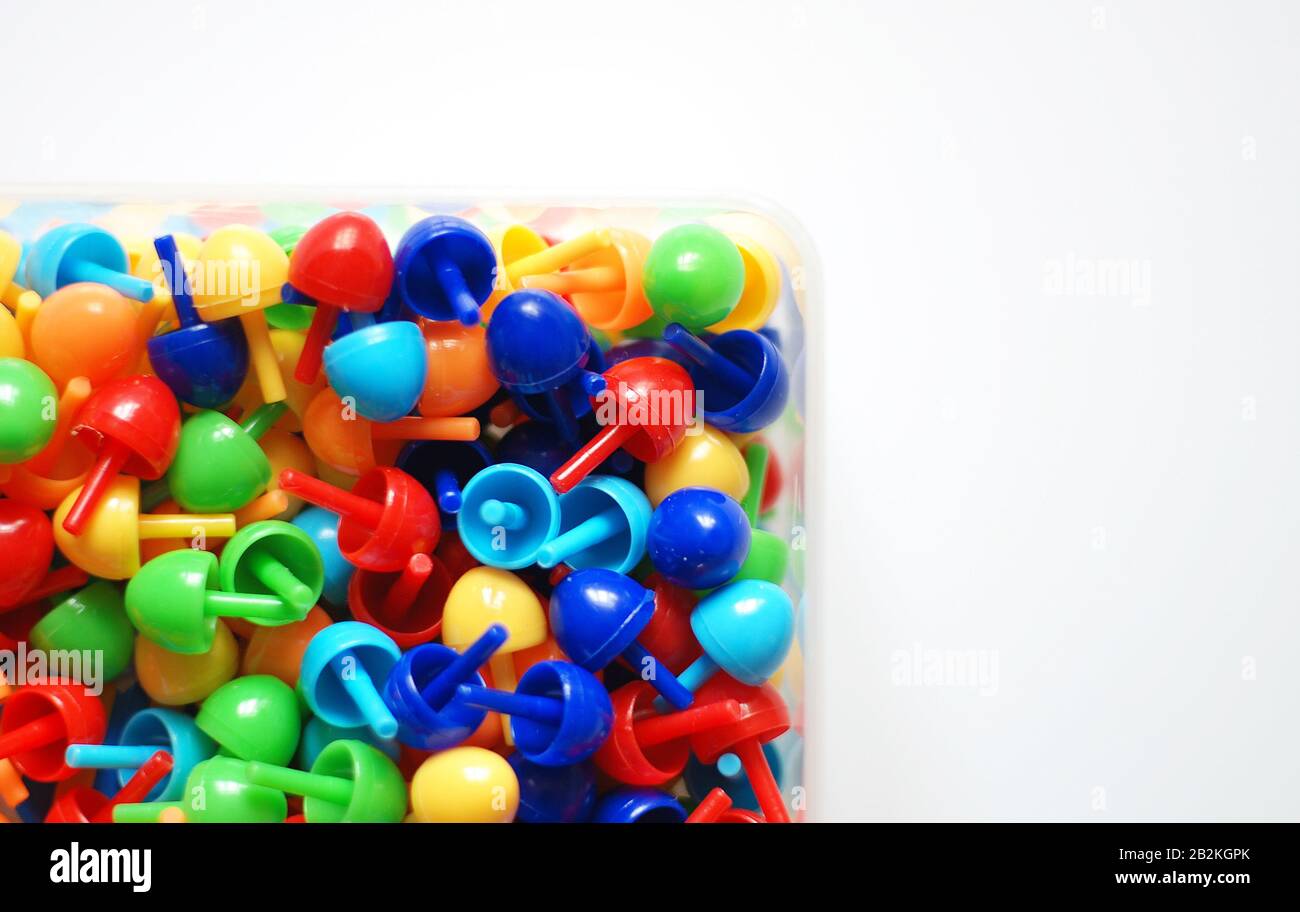 isolated box with colorful pins objects inside aerial Stock Photo - Alamy