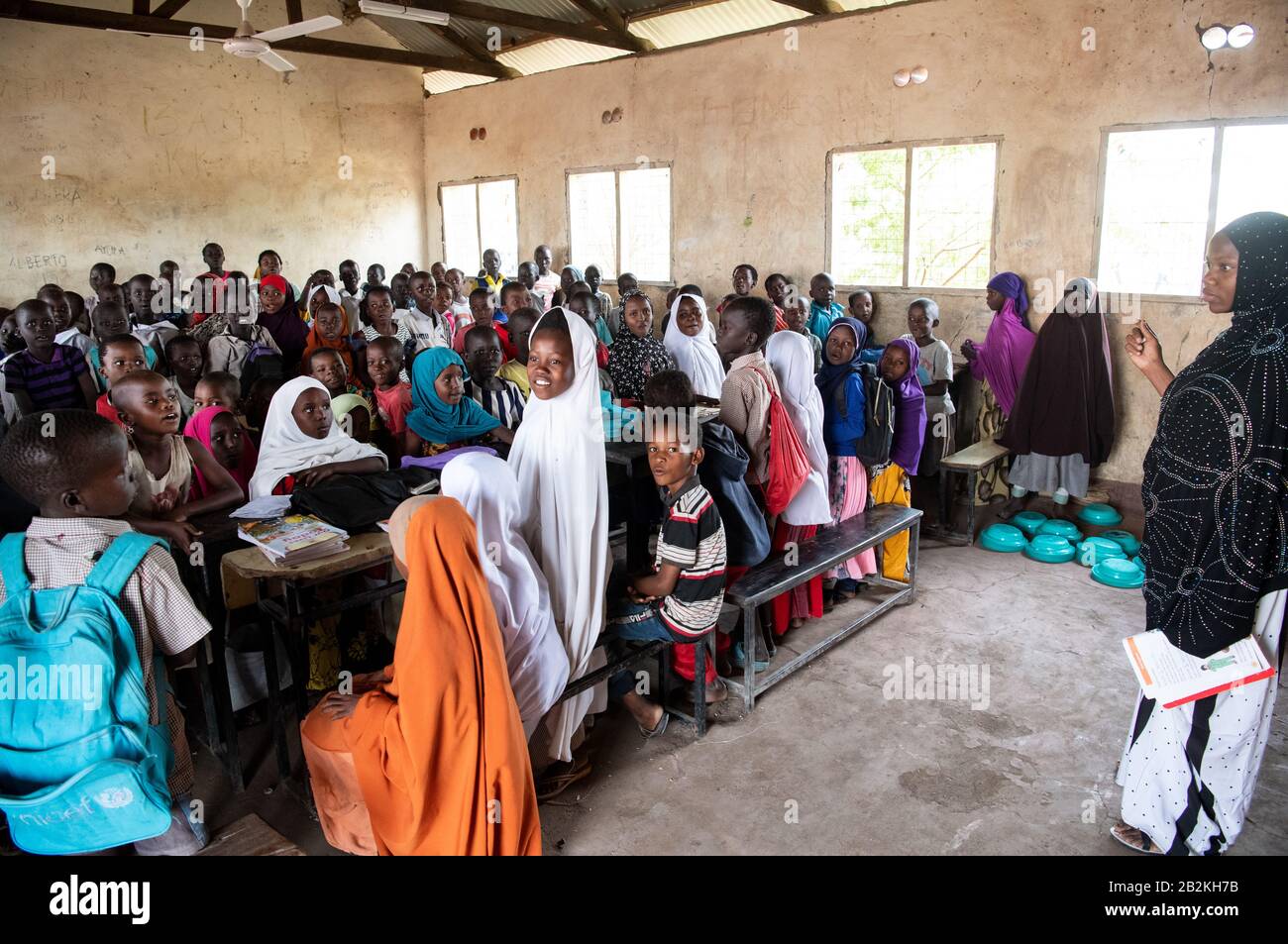 26 February 2020, Kenya, Kakuma: Numerous children are gathered in a ...