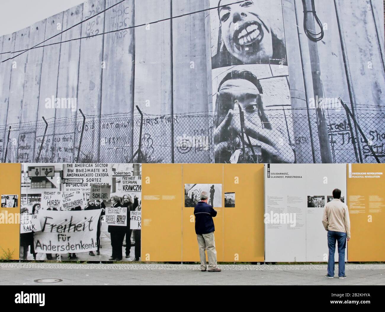 The Information wall near to Checkpoint Charlie in Berlin, Germany. Two ...