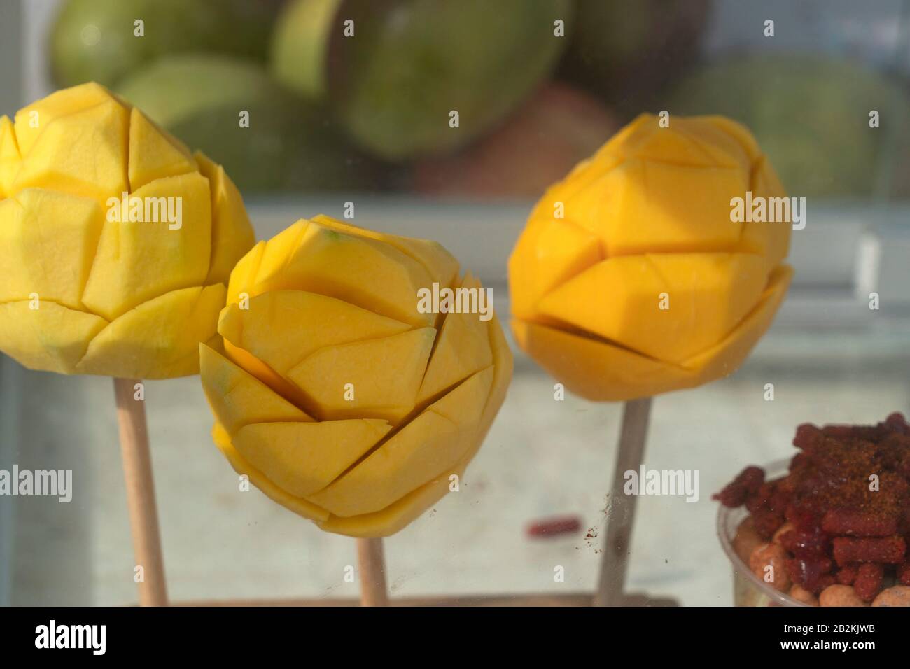 Mango on a stick hi-res stock photography and images - Alamy