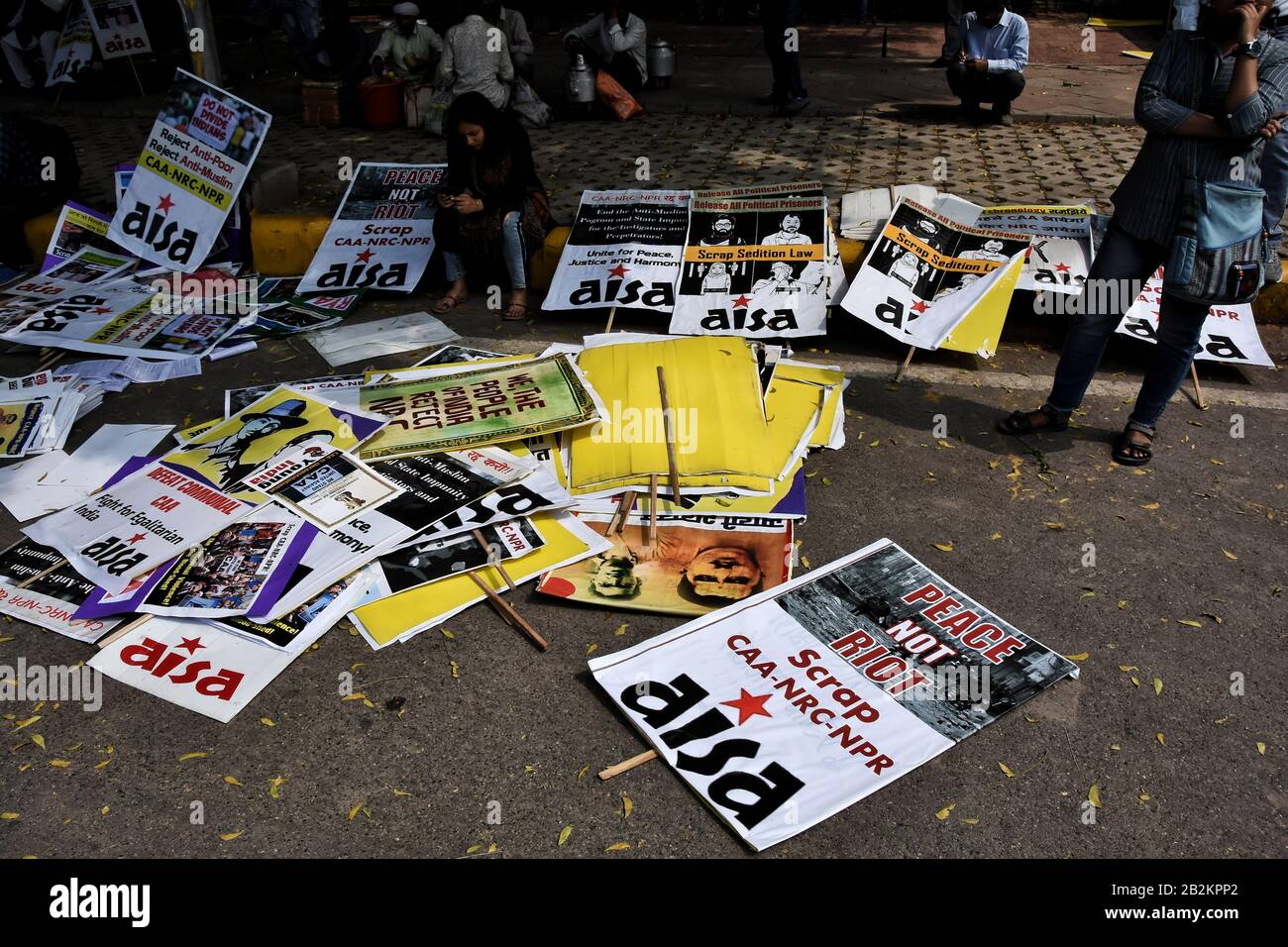 Placards laying on the road during a protest by Young Indians against ...