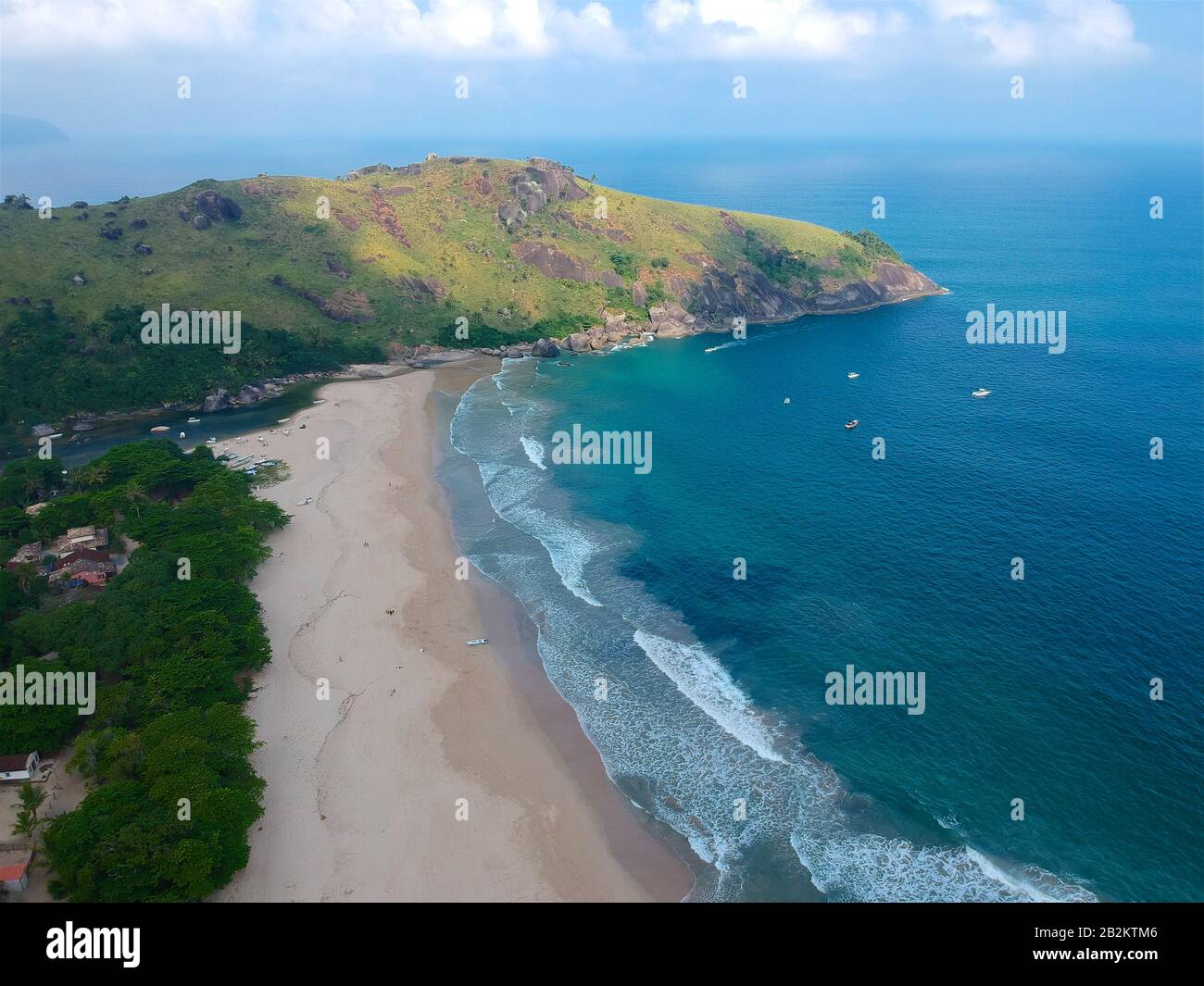 Aerial view of white sandy beach with turquoise water in tropical ...