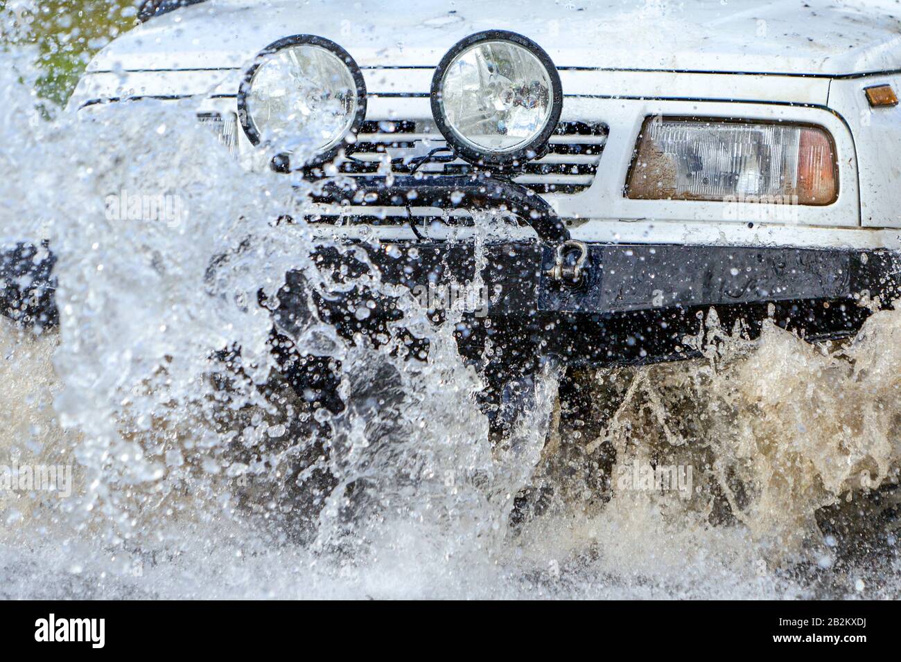 4X4 Car Off Road Driving Into The Water Stock Photo - Alamy