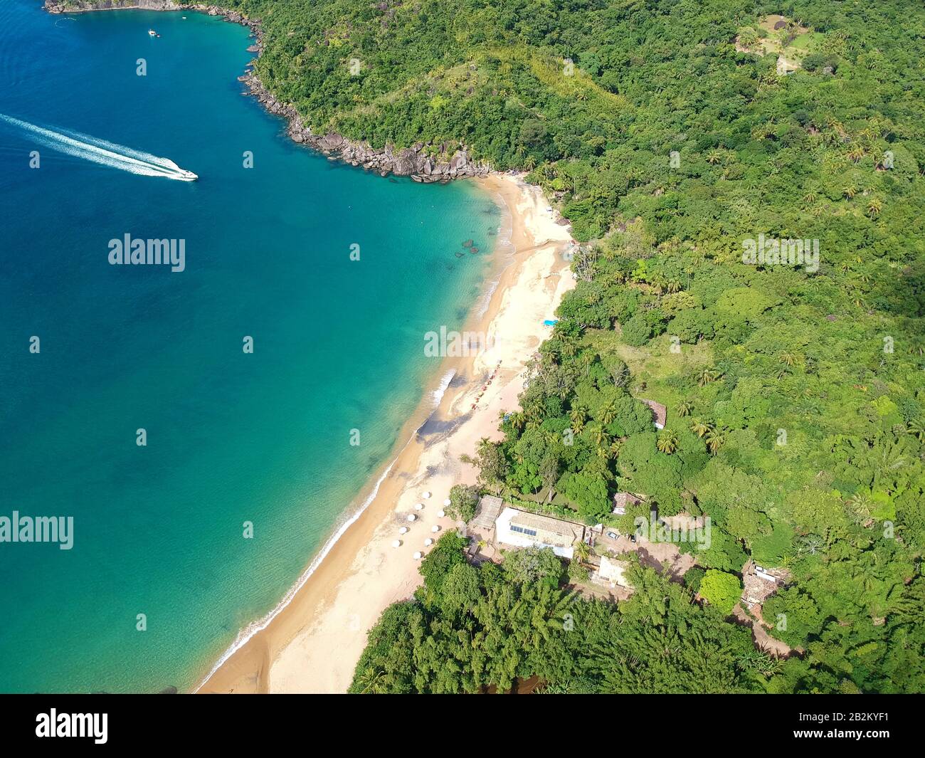 Aerial view of white sandy beach with turquoise water in tropical ...