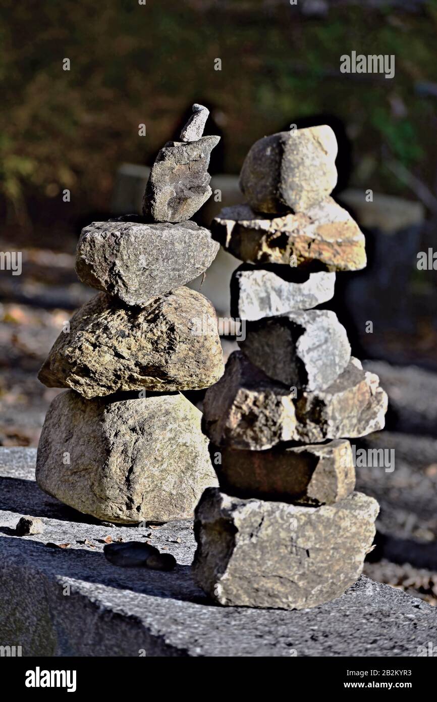 Two balancing rock stacks closeup view Stock Photo - Alamy