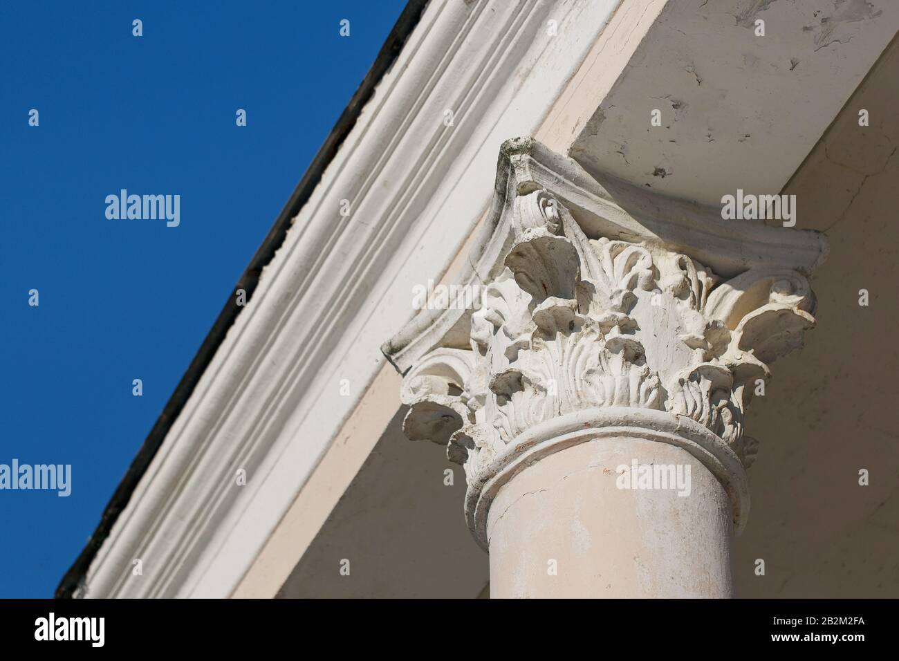 Element of an old ion column against a blue sky. Vintage element of ...