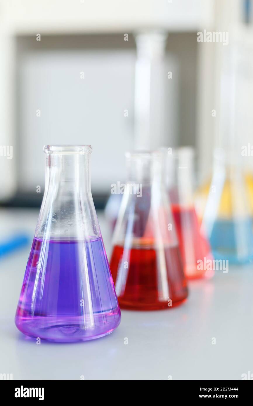 Test tubes with pink solution hi-res stock photography and images - Alamy