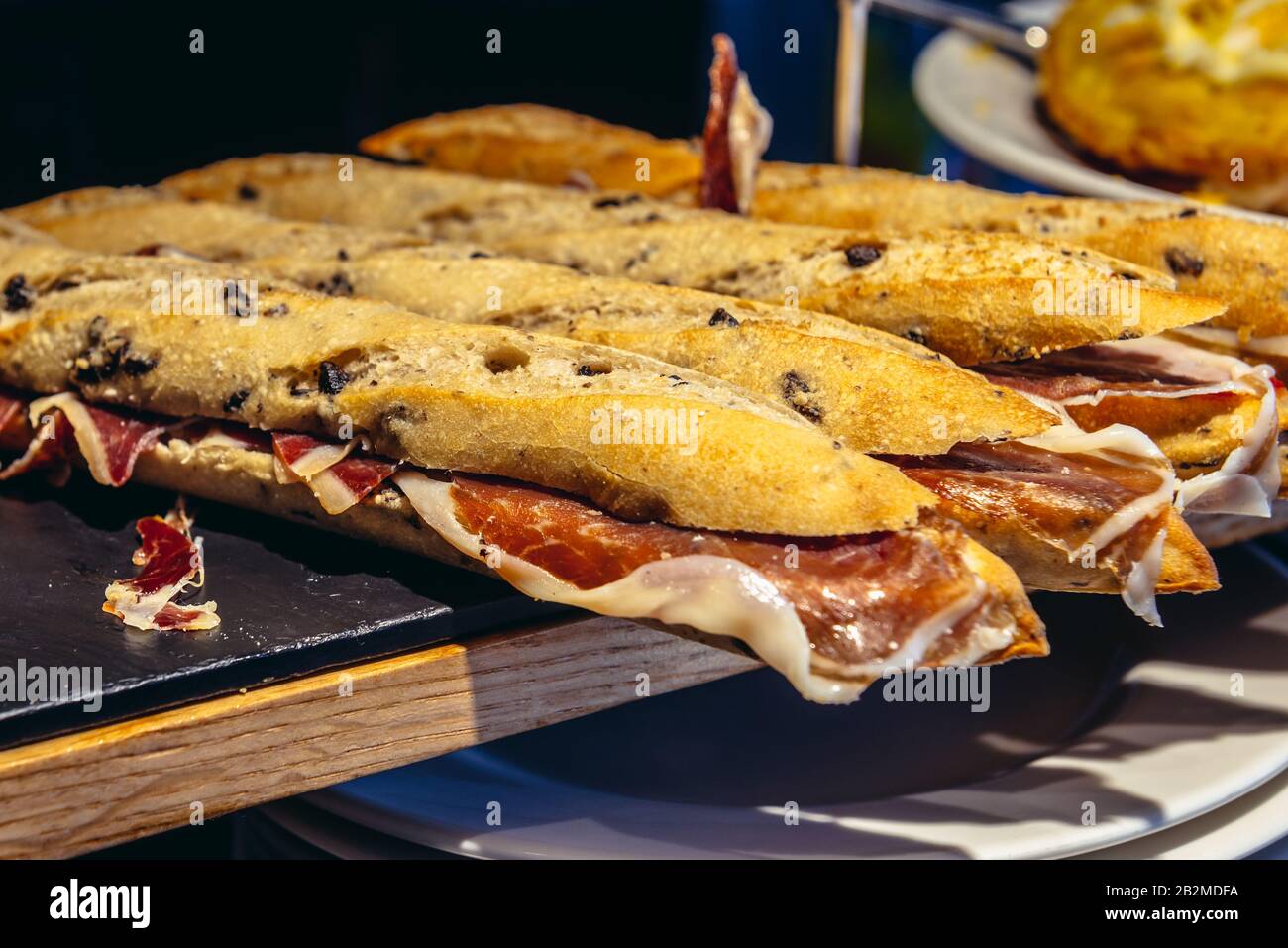 Sandwiches with jamon in tapas bar in San Sebastian coastal city and ...