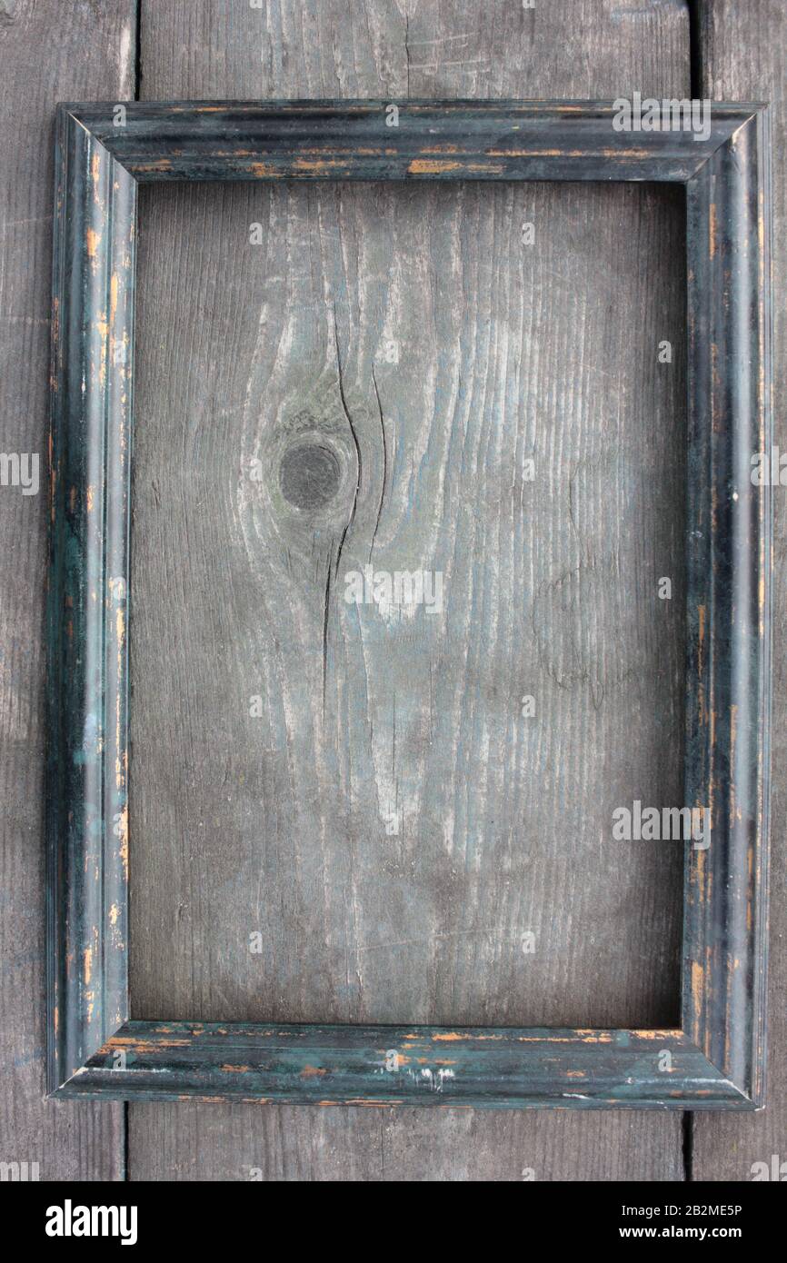Empty vintage photo frame on shabby wooden background. Copy space Stock ...