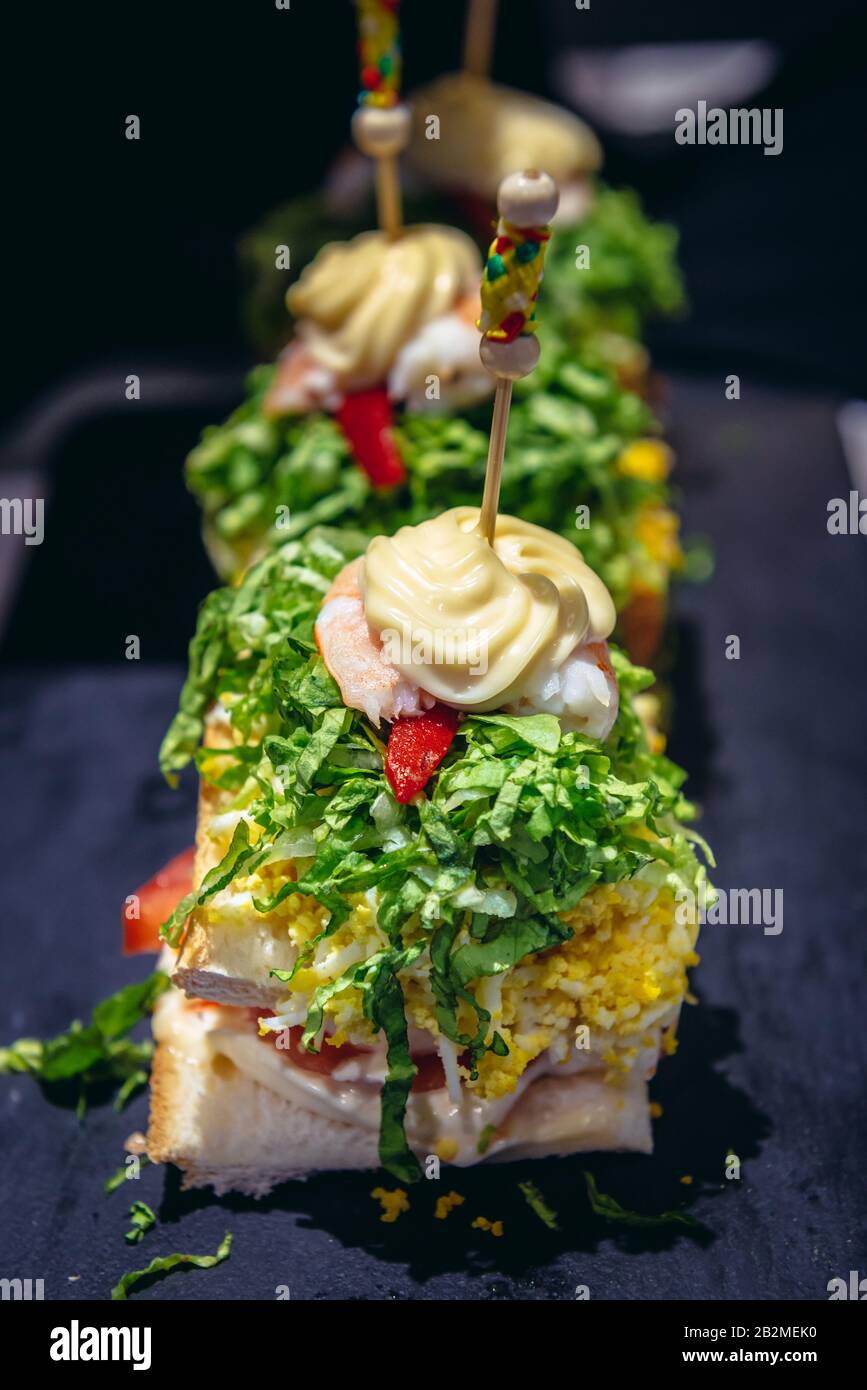 Pinchos in tapas bar in San Sebastian coastal city located in the ...