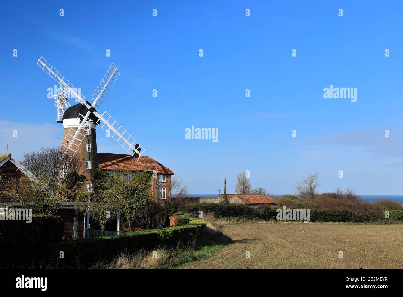 View over Weybourne Windmill, Weybourne village, North Norfolk, England ...
