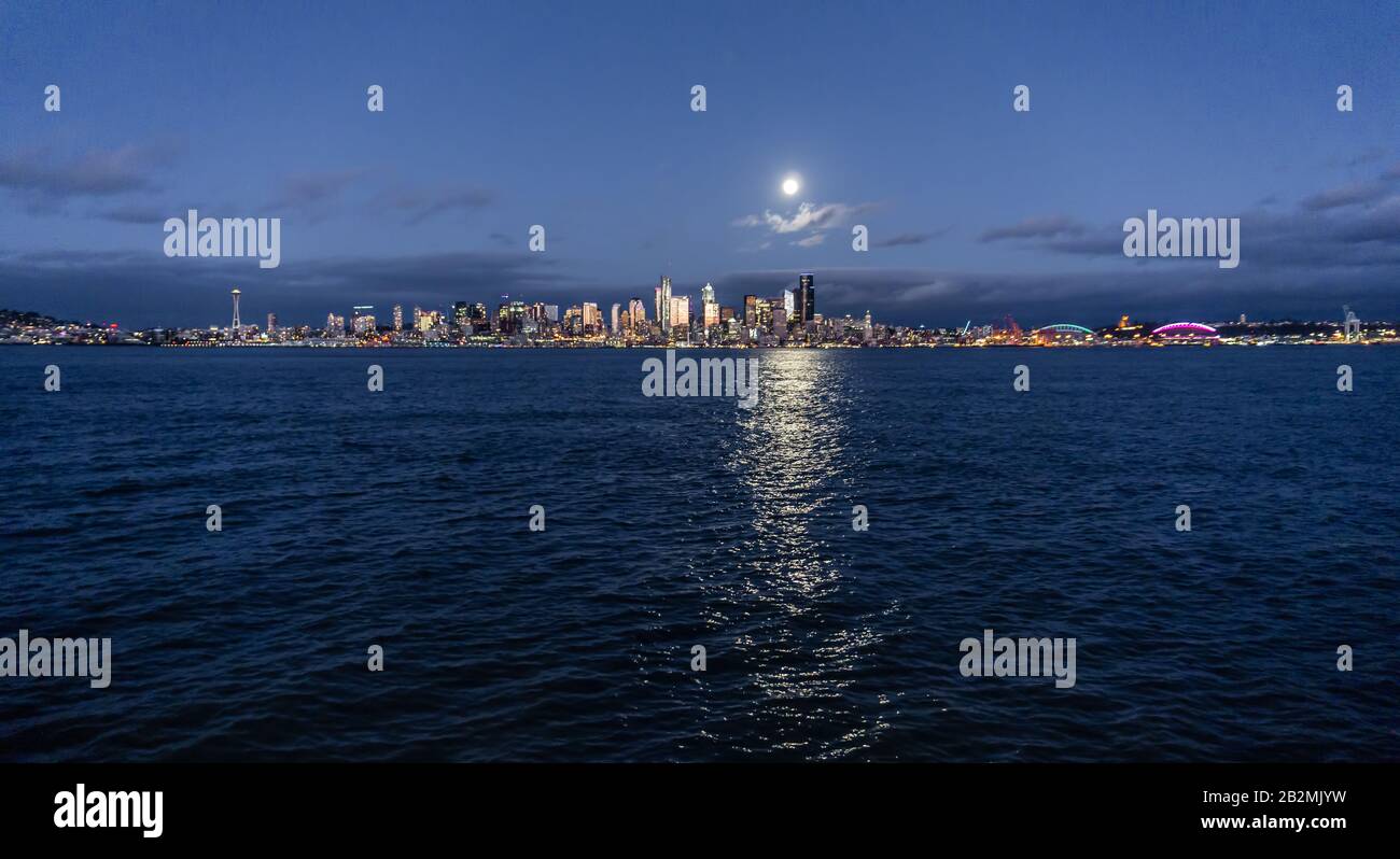 A bright full moon shines over the Seattle skyline Stock Photo - Alamy