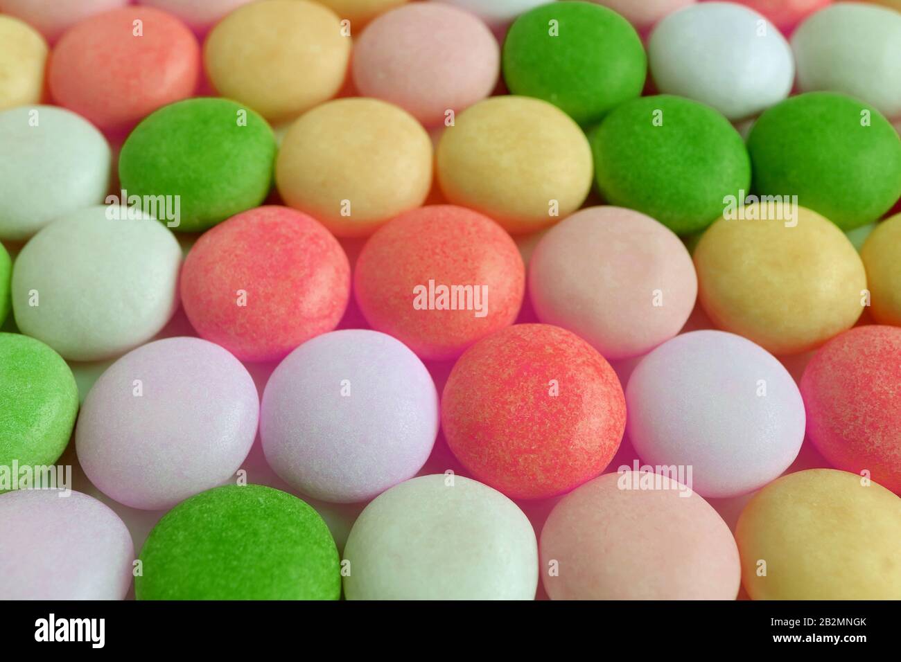 Lined Up Multi-color Round Shaped Candies for Background or Banner ...