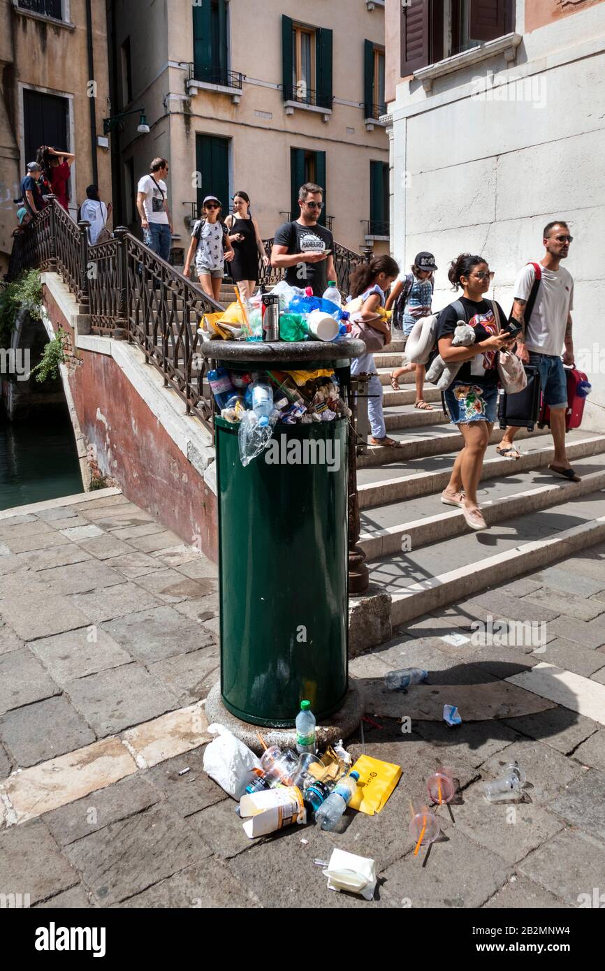 Over flowing litter, rubbish bins, Venice, Italy Stock Photo - Alamy