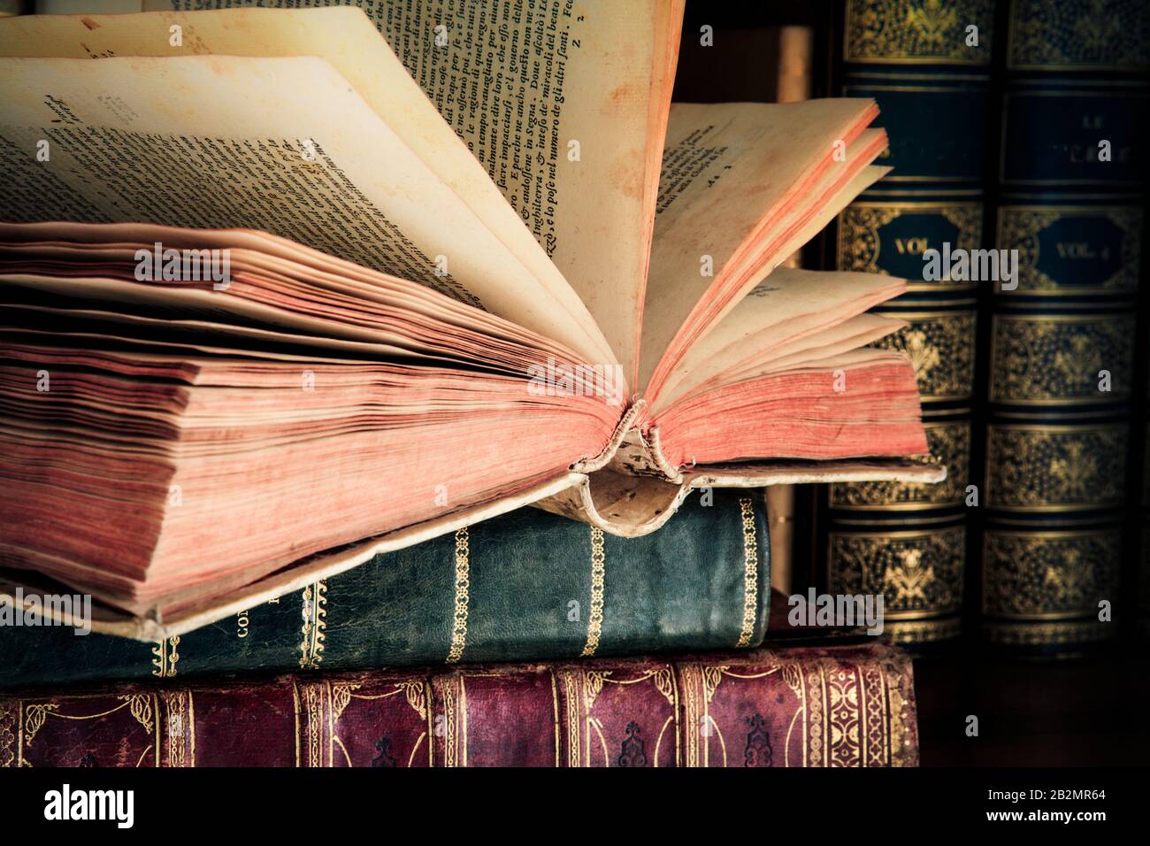 old overlapping ancient books - close up Stock Photo - Alamy