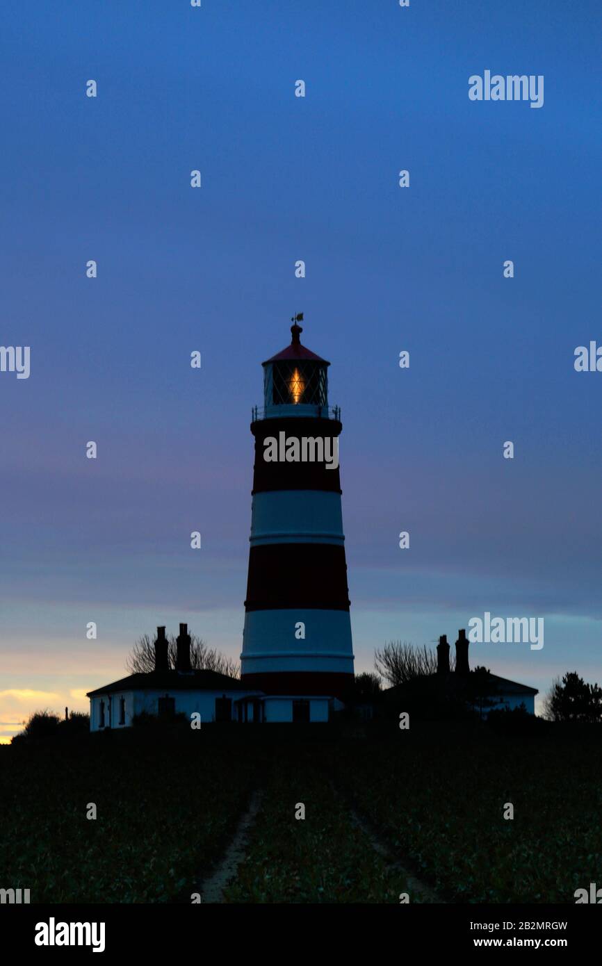 Sunset over Happisburgh Lighthouse, Happisburgh village, North Norfolk ...