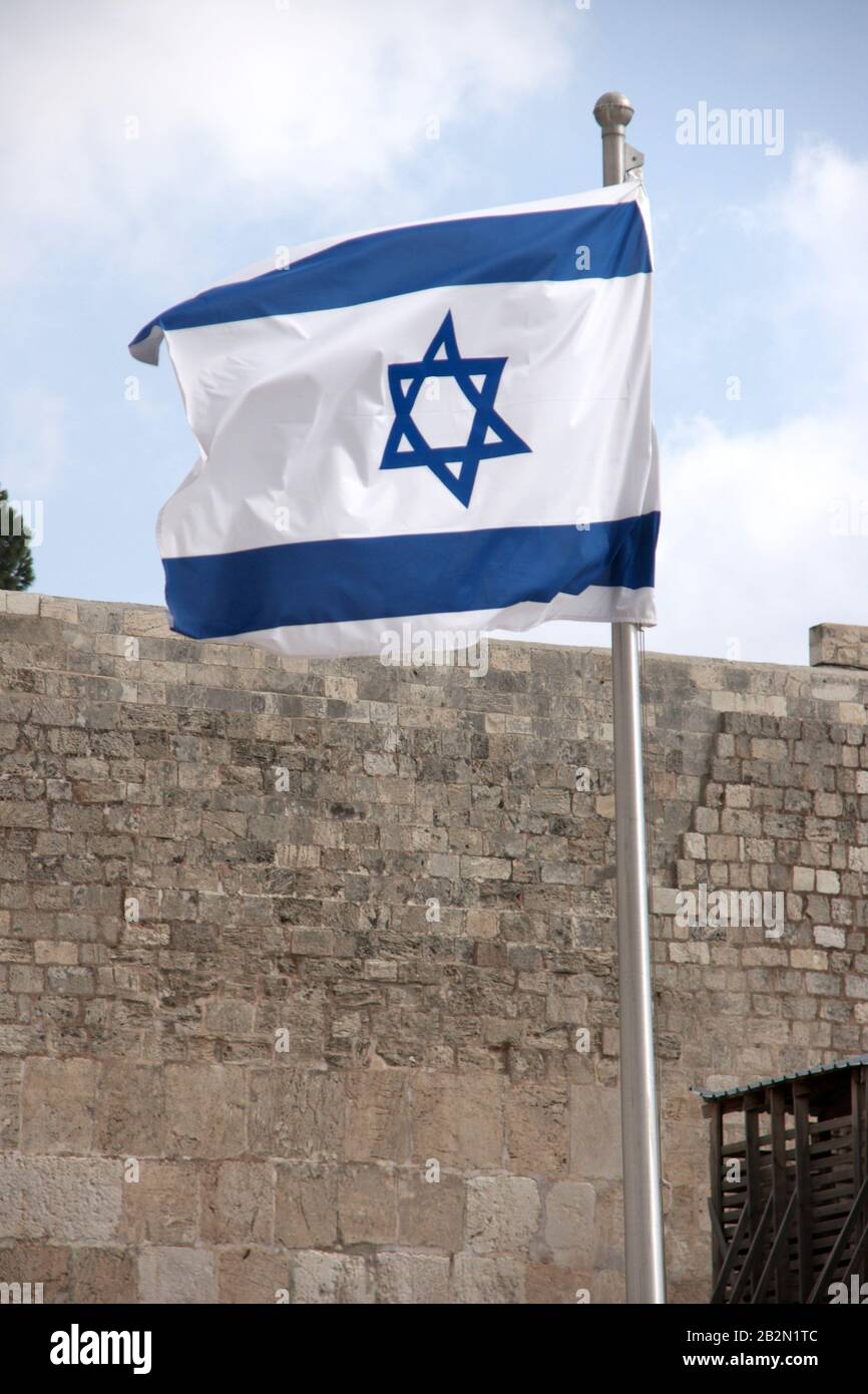 Flag of state of Israel over western wall in jerusalem Stock Photo - Alamy