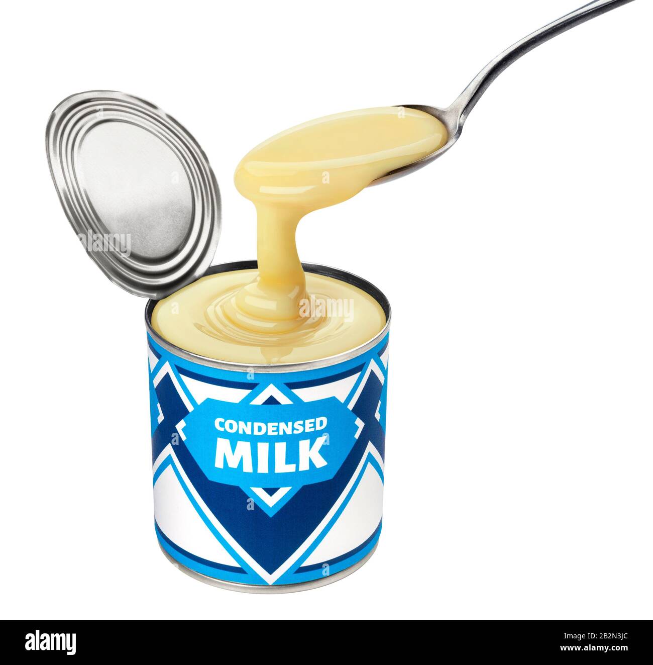 Pouring condensed milk isolated on white background Stock Photo - Alamy