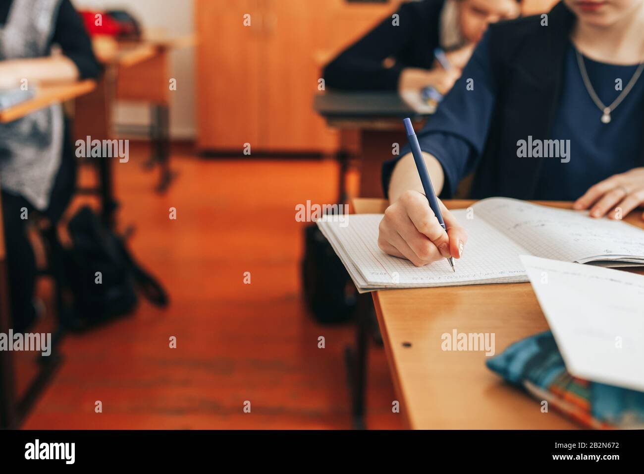 Students writing exam uniform hi-res stock photography and images - Alamy