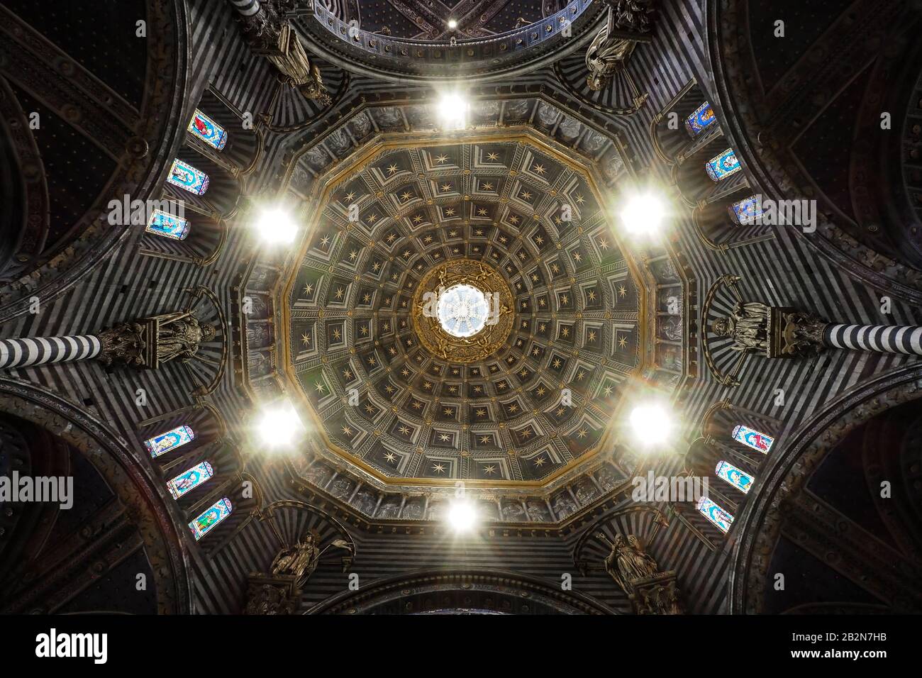 Interior view of the ceiling of the Dome of Siena (Duomo) by day Stock ...