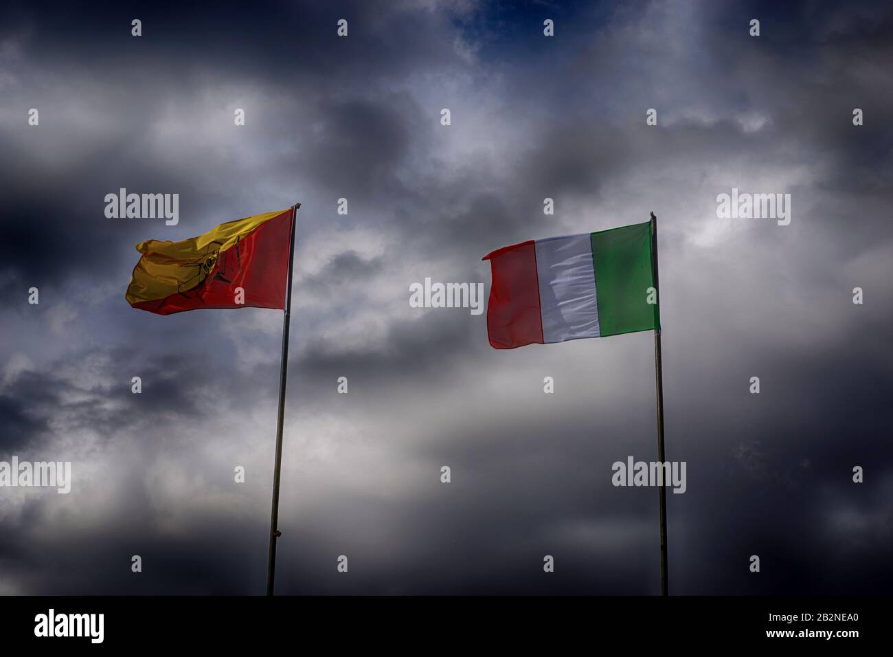 Italy flag and Sicily flag with dramatic clouds as the background Stock ...