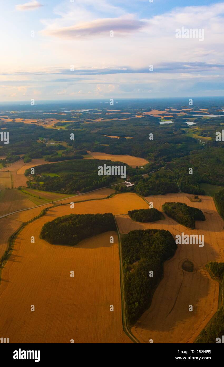 Aerial view of Swedish scountryside with farmlands,green forests and ...