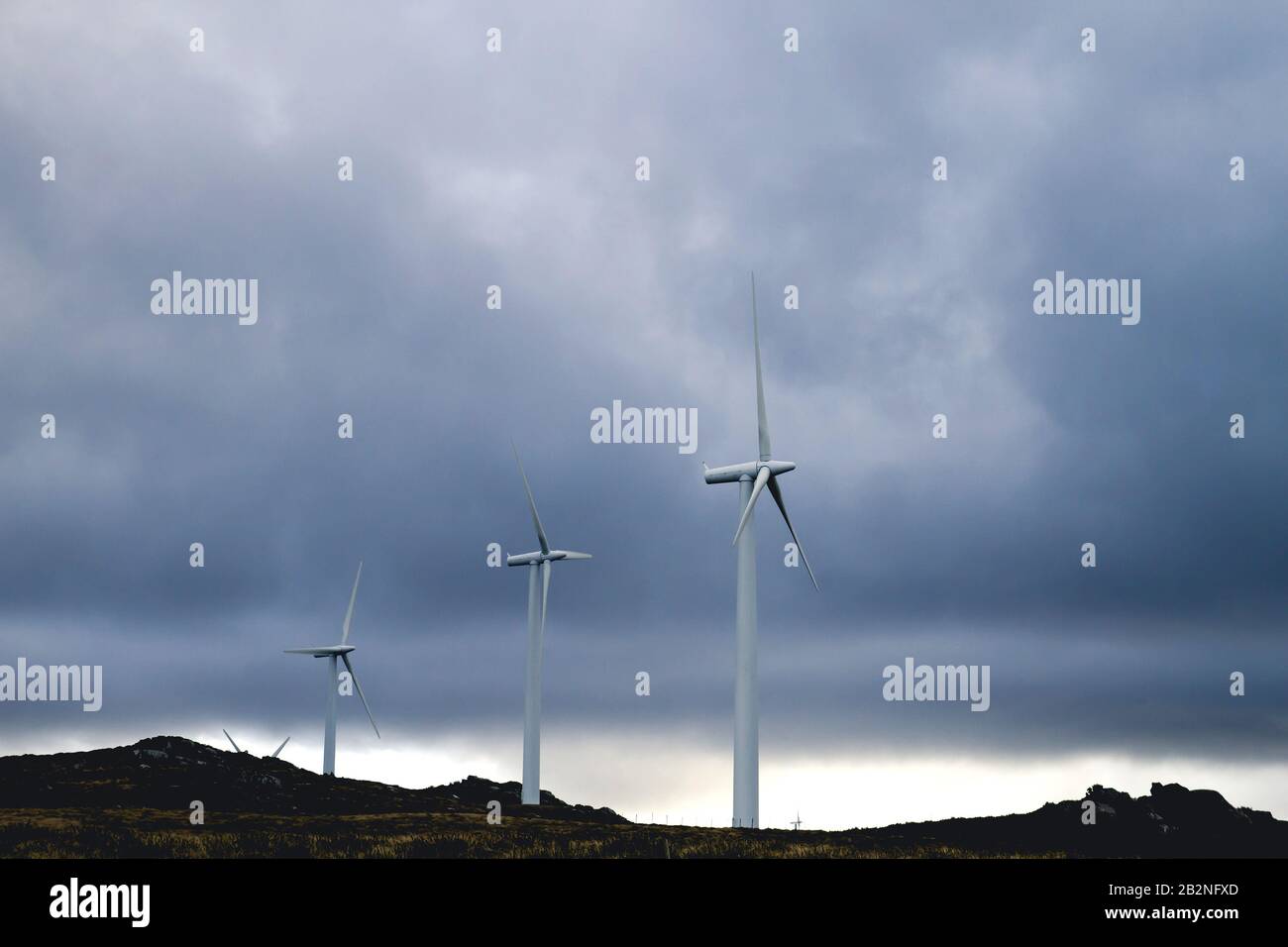 Wind turbines generating clean renewable energy Stock Photo - Alamy