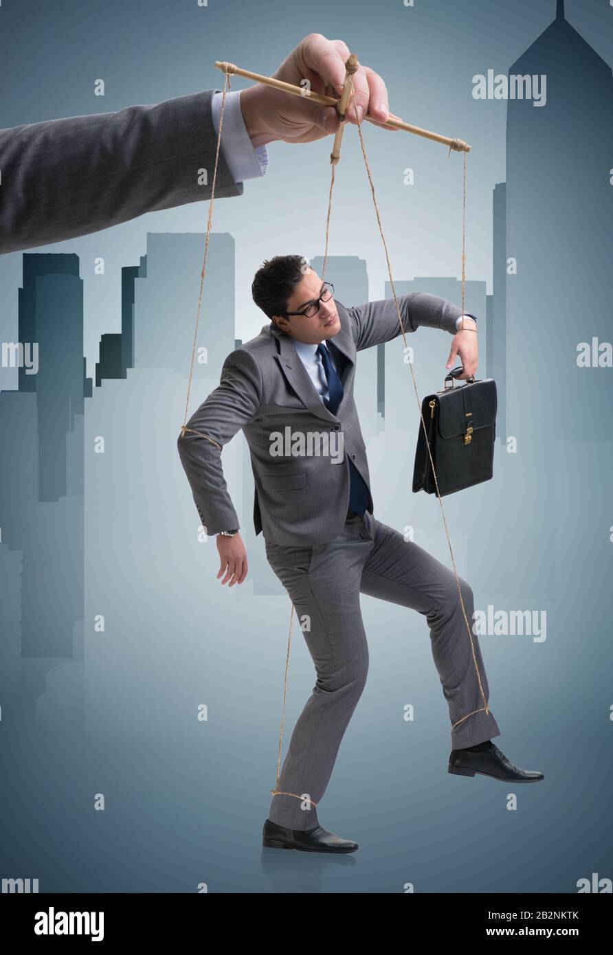 The businessman puppet being manipulated by boss Stock Photo - Alamy