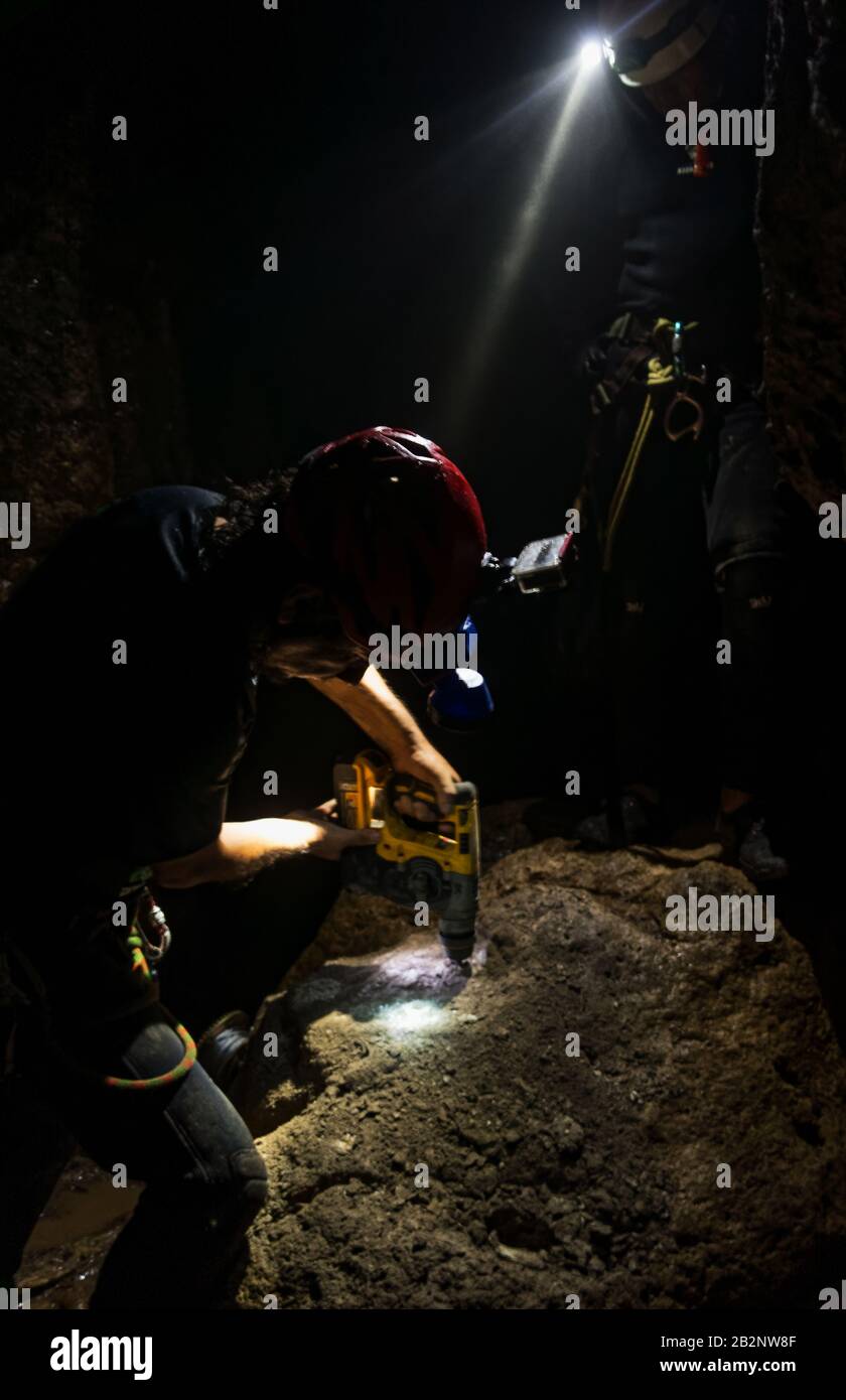 Speleologist Fixing A Route At Mayei Cave Underground In Ecuador Stock ...