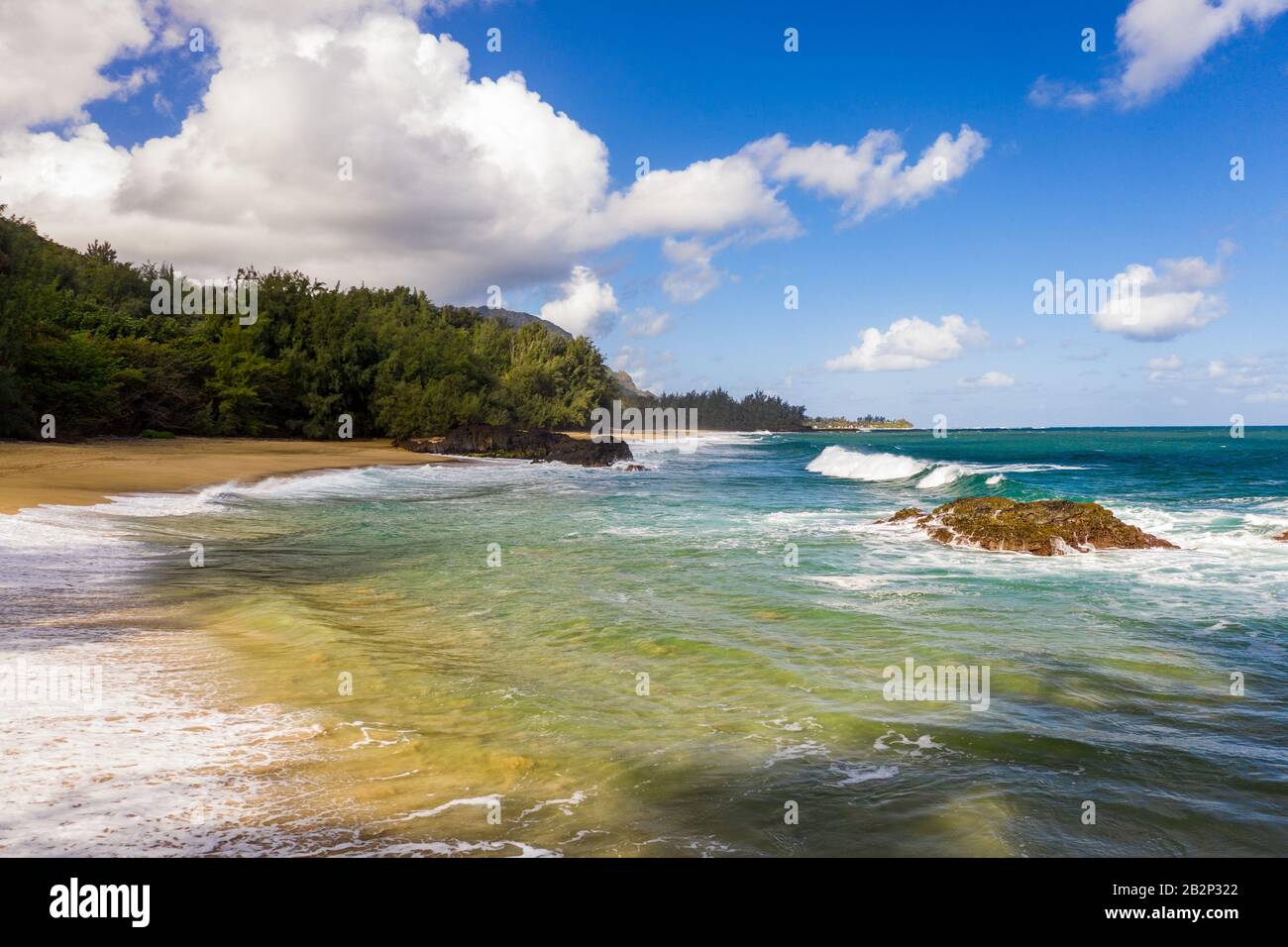 Aerial panoramic image off the coast over Lumaha'i beach on Hawaiian ...