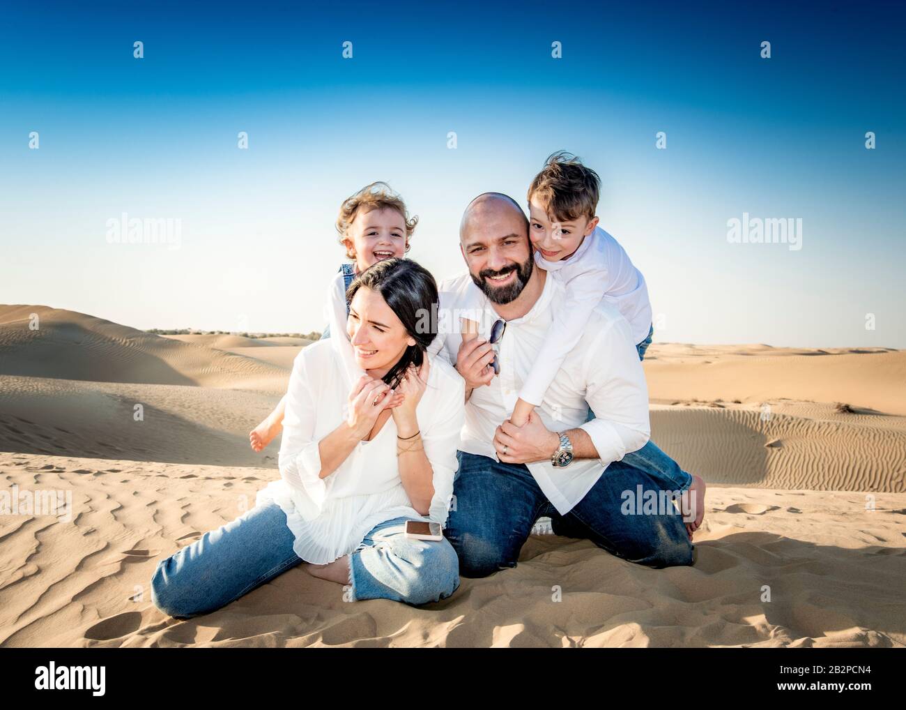 Happy family group portrait hi-res stock photography and images - Alamy