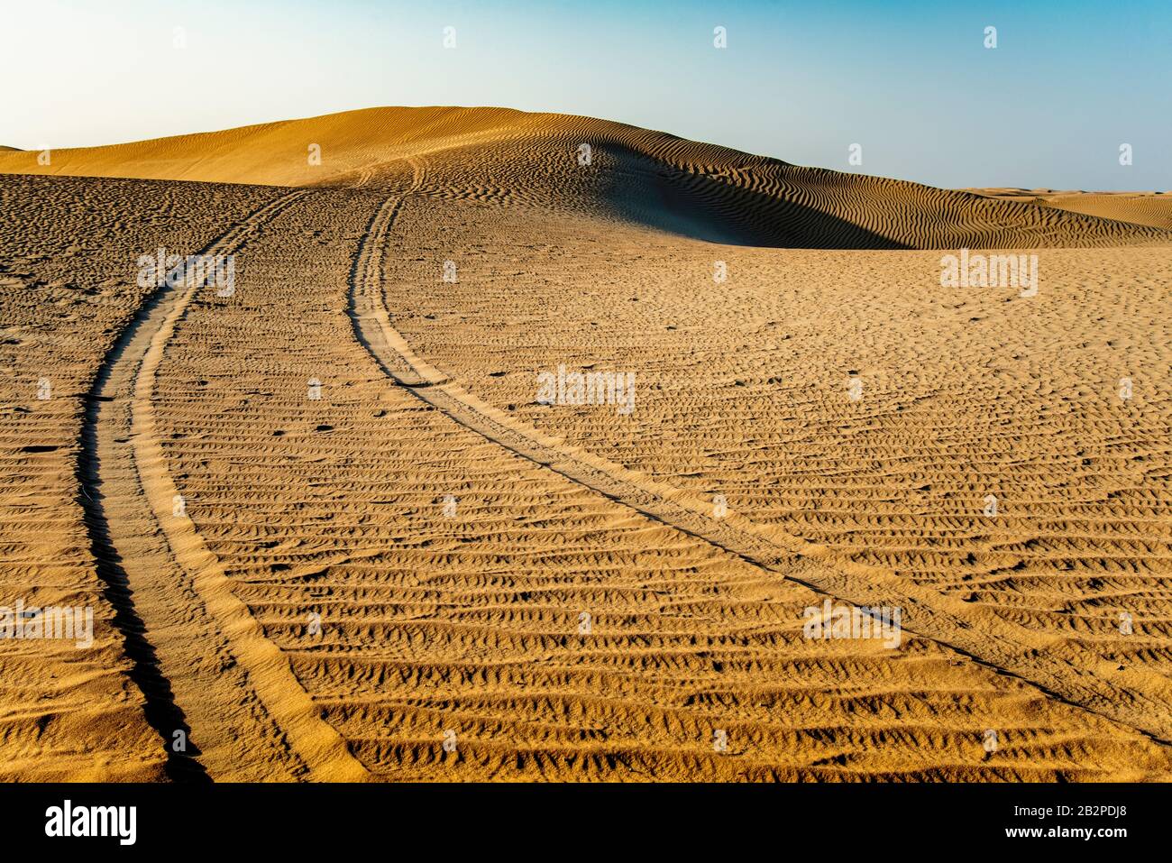 color image taken at dusk, abstract view of Tyre tracks through,the ...